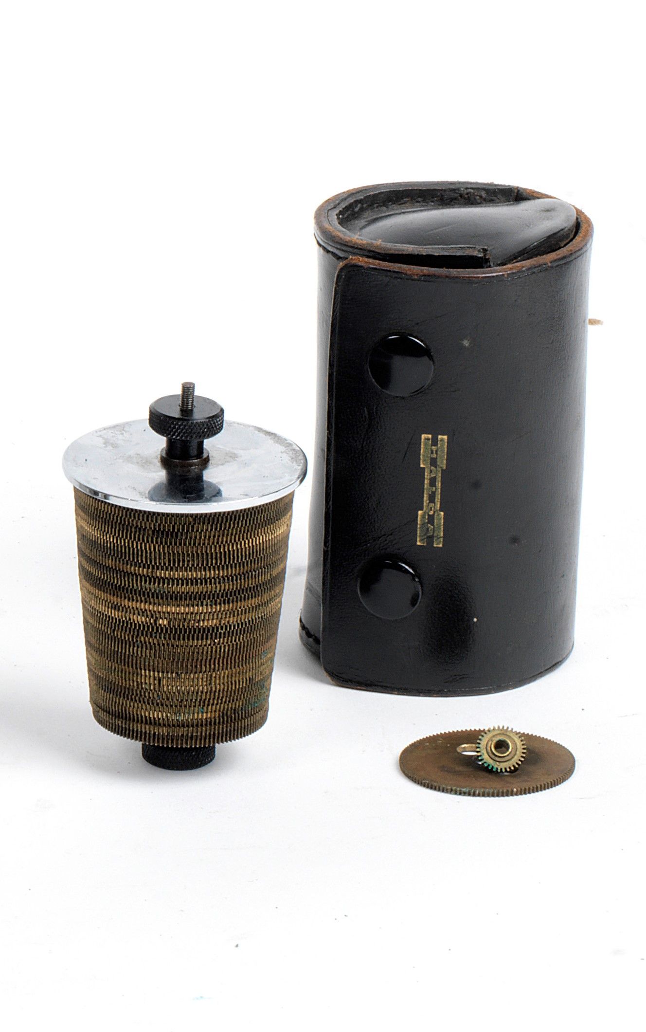 Bonhams Cars : A leather-cased Halda 'Twin Master' cog set,