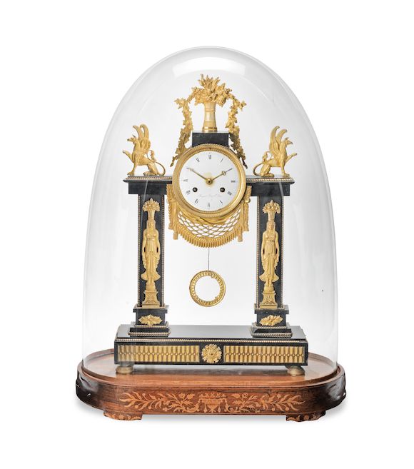 Bonhams : An Empire ormolu-mounted black marble mantel clockThe dial ...