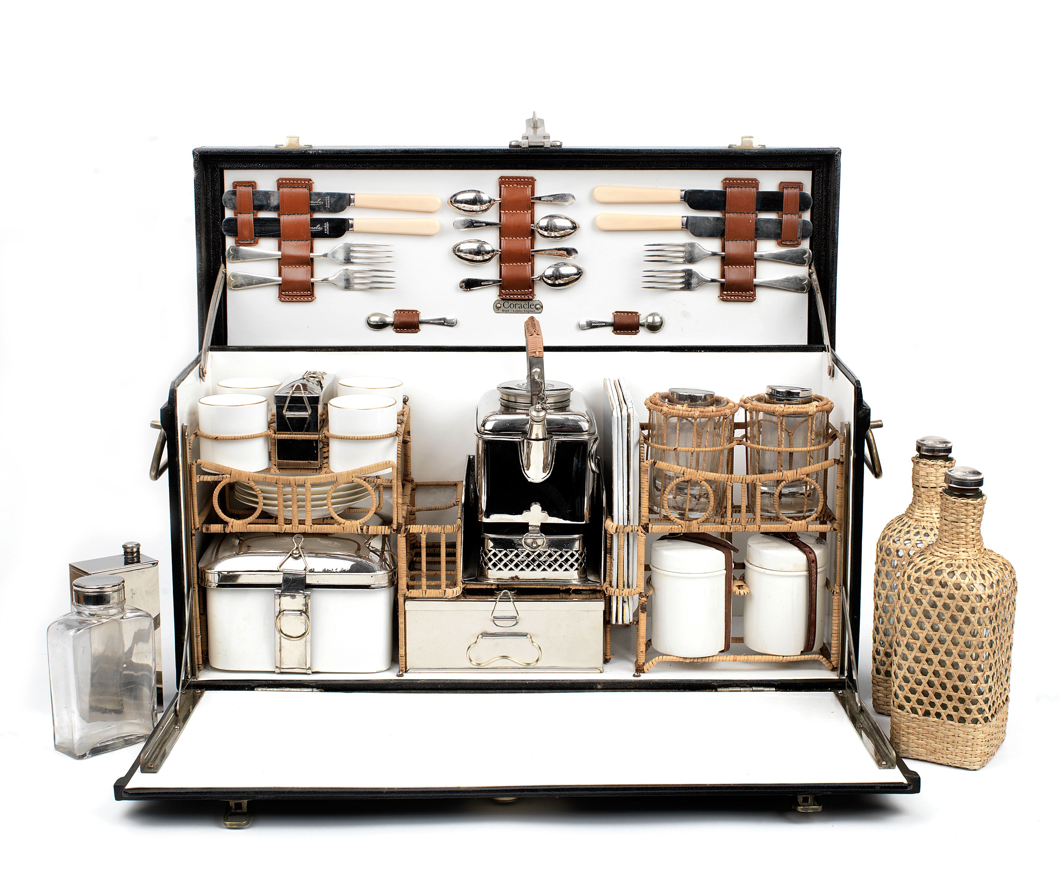 Bonhams Cars : A cased 'Coracle' picnic set for four persons by G.W ...