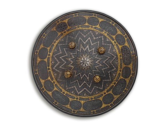 Bonhams : A Qajar gold and silver damascened steel shield (Sipar ...