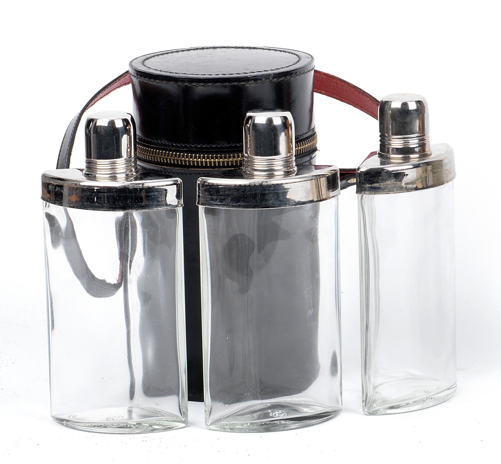 Bonhams Cars : A leather-cased travelling set of three sprits flasks,
