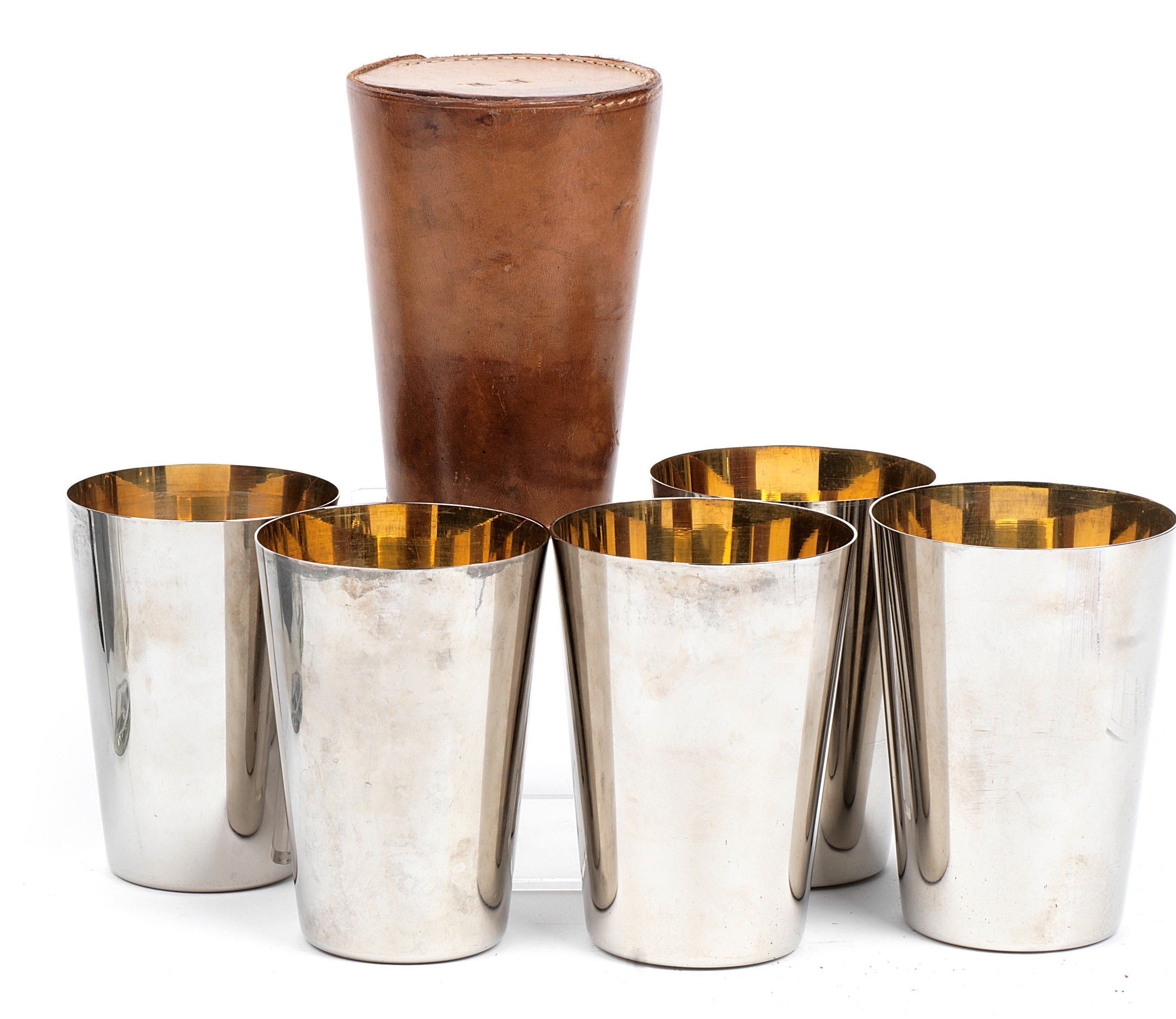 Bonhams Cars : A vintage leather-cased set of five graduated beakers,