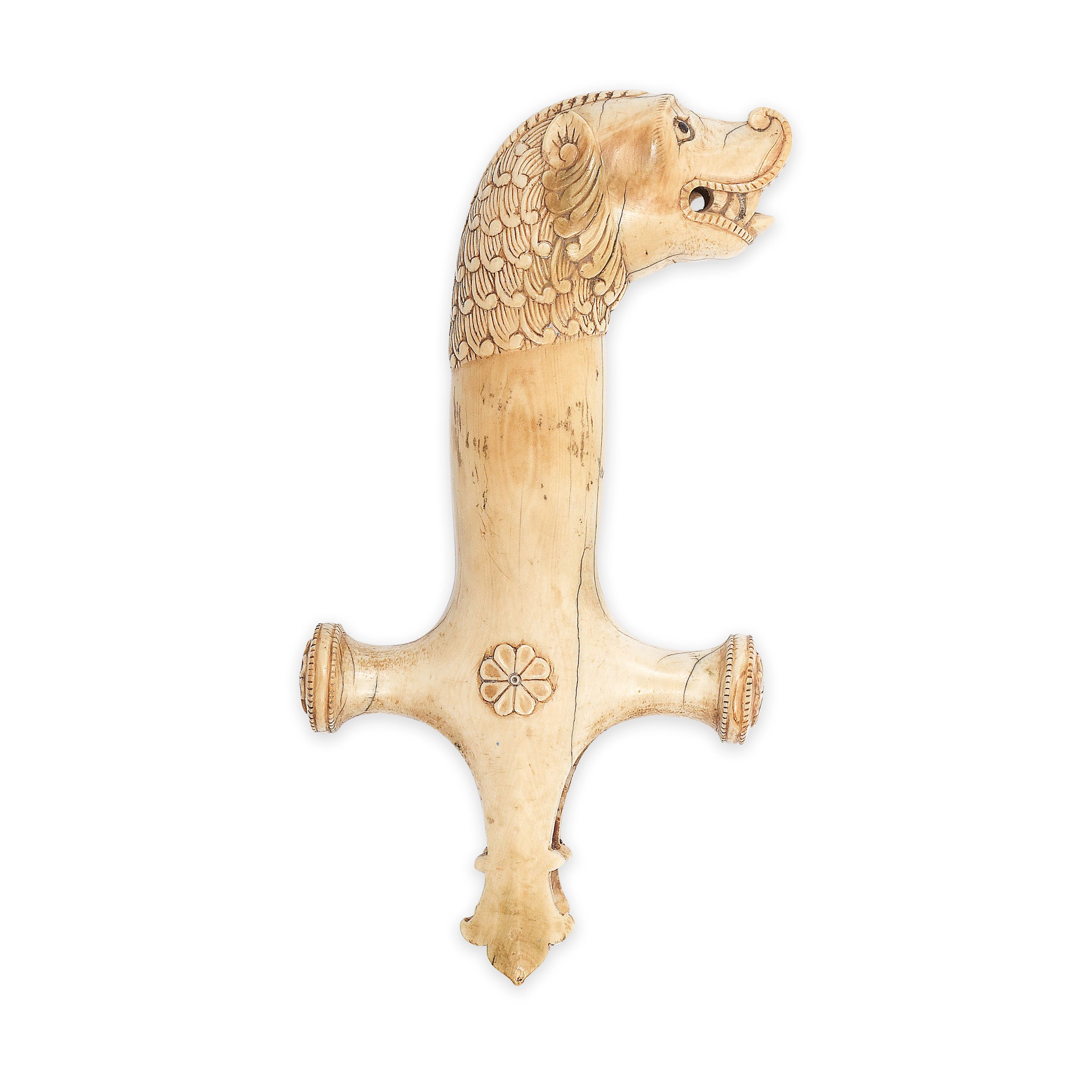Bonhams : A carved ivory Makara head sword hilt India, 19th Century