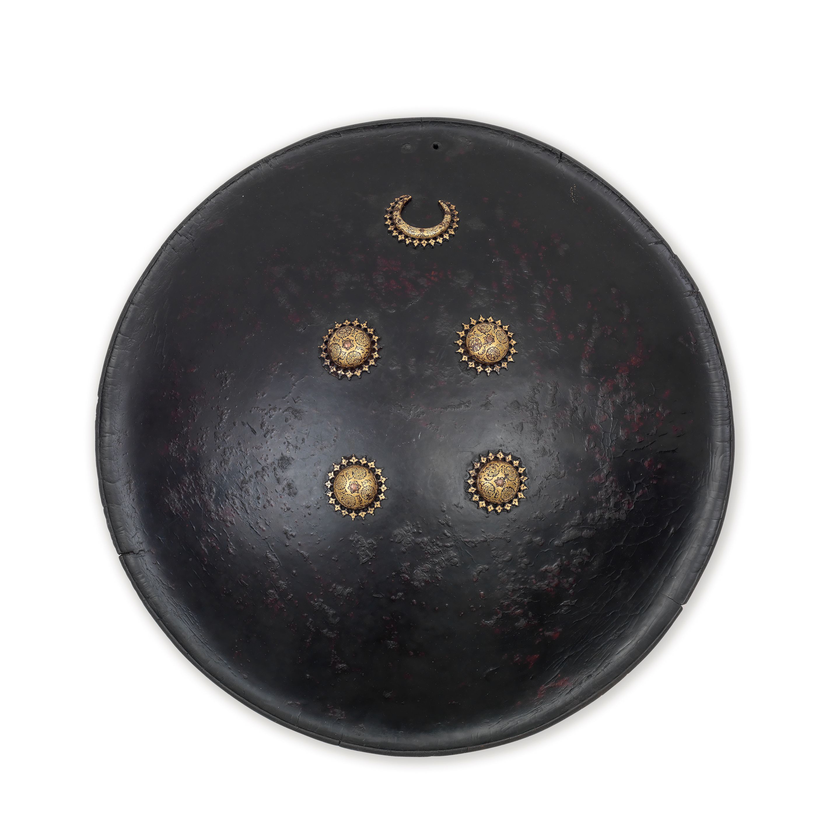 Bonhams : A Mughal lacquered-hide shield (Dhal) with gold-inlaid steel ...
