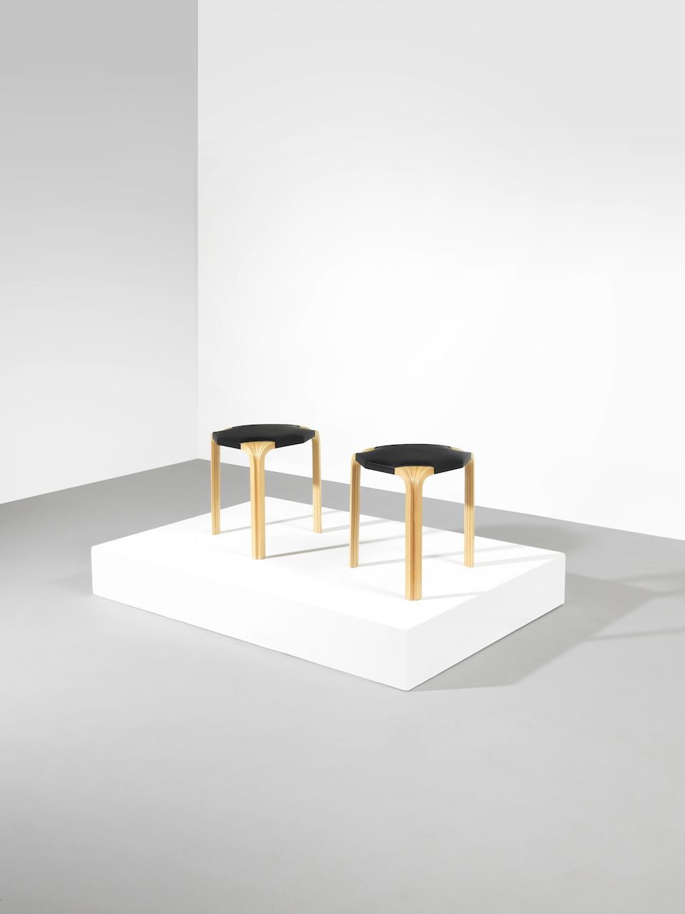 Alvar Aalto Pair of 'Fan leg' stools, model no. X602, designed 1954 ...