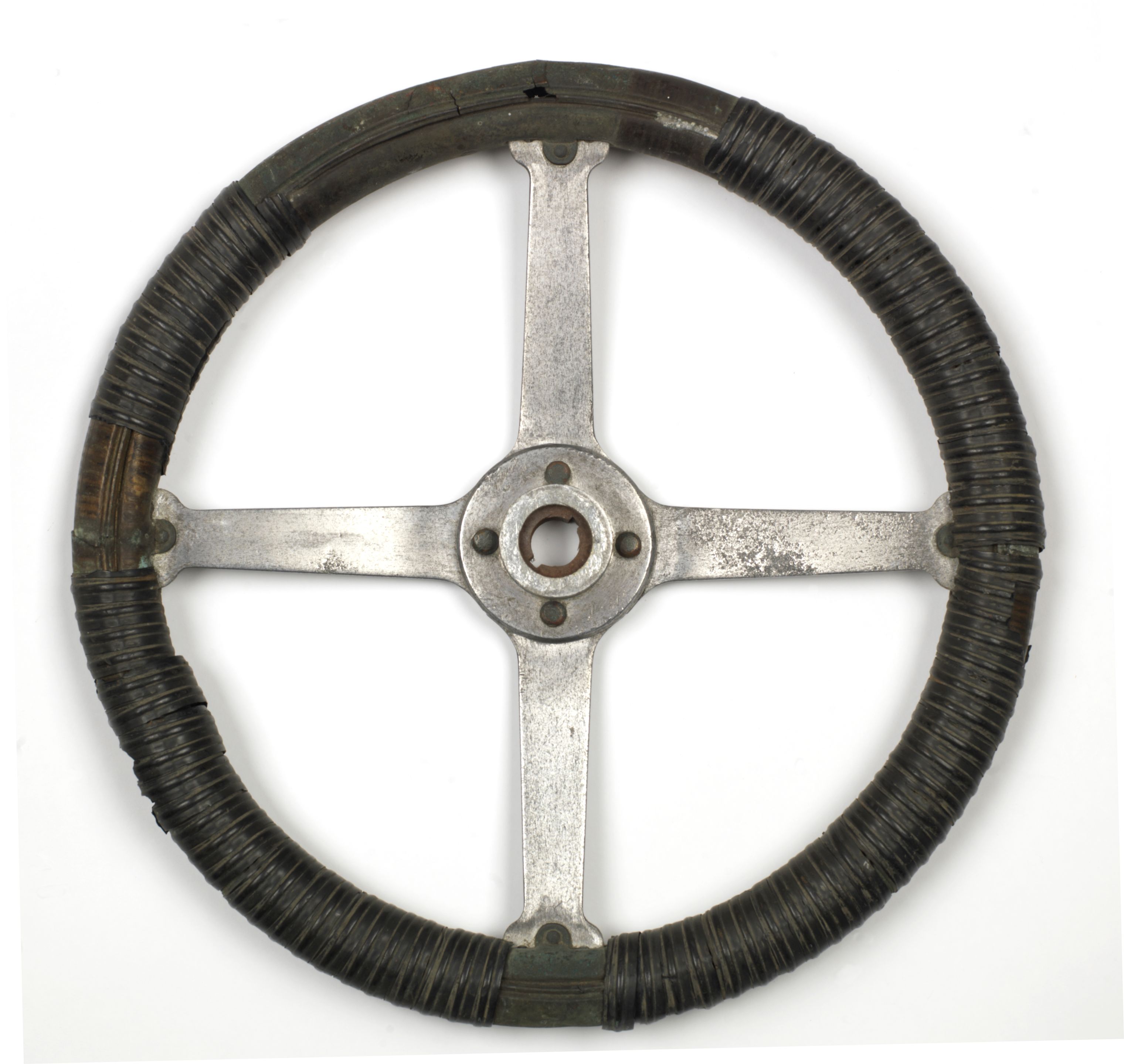 Bonhams Cars : A vintage four-spoke steering wheel, patented 1906 and 1912,