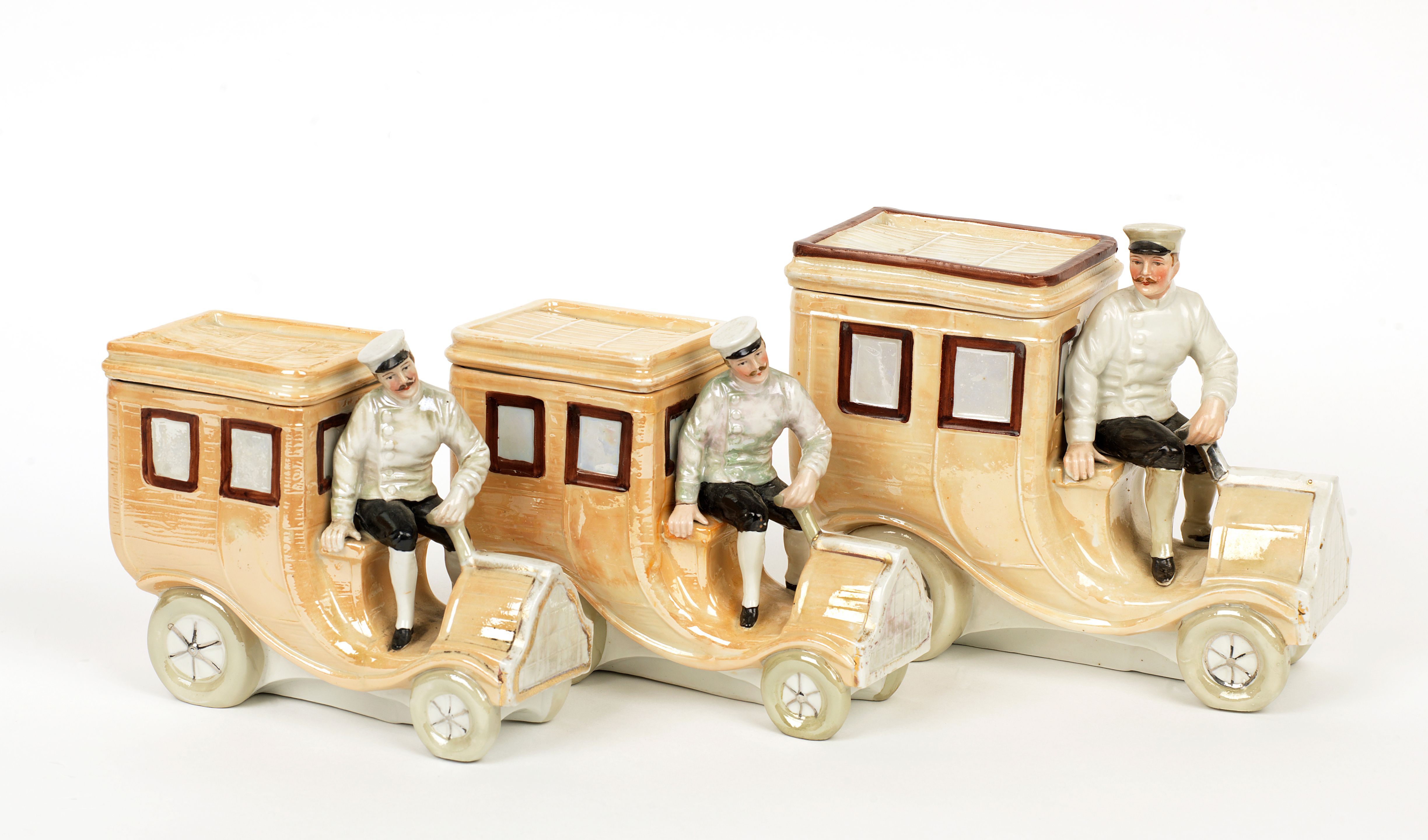 Bonhams Cars : Three ceramic bon-bon jars in the form of Edwardian ...