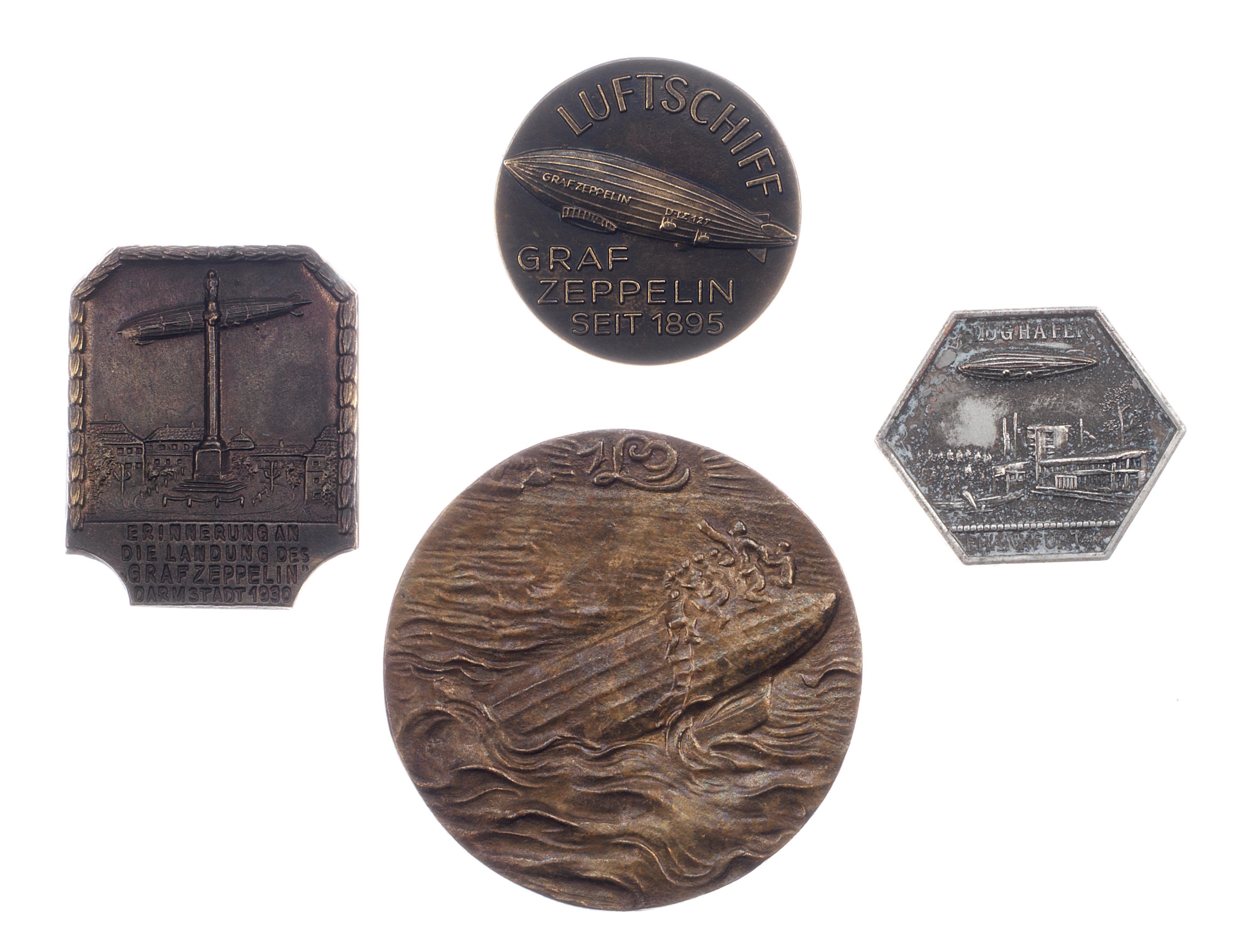 Bonhams Cars : Four plaques and badges depicting Graf Zeppelin ...