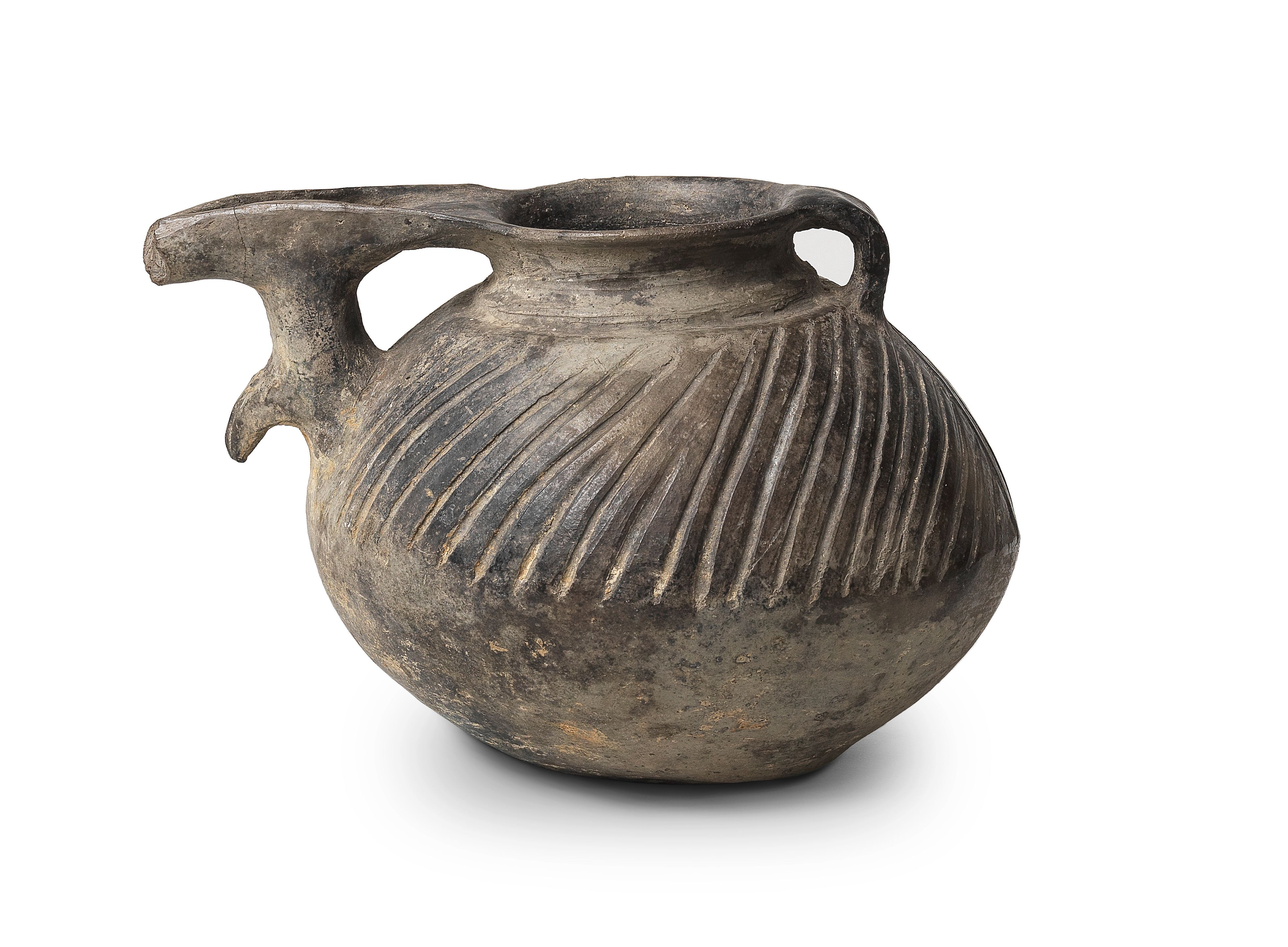 Bonhams : An Iranian grey-ware pottery spouted vessel