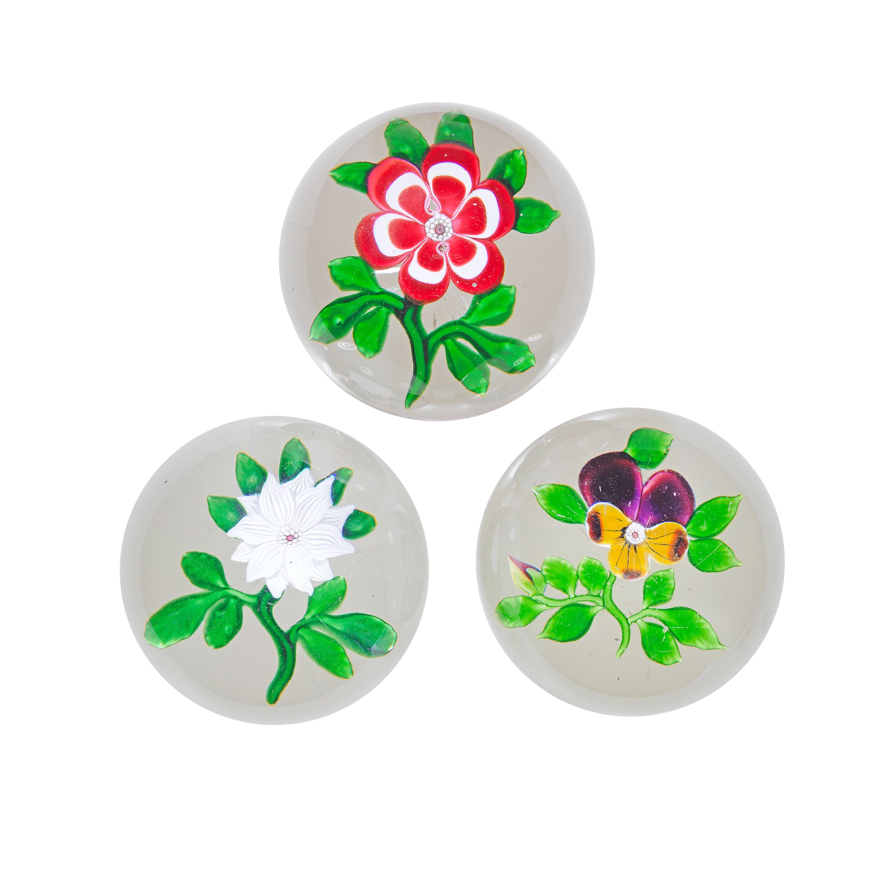 Bonhams : Three Baccarat flower paperweights, circa 1850