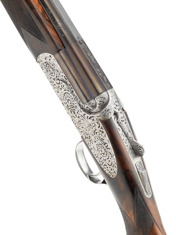 Bonhams : A Marocchi-engraved 12-bore single-trigger side-plated round ...