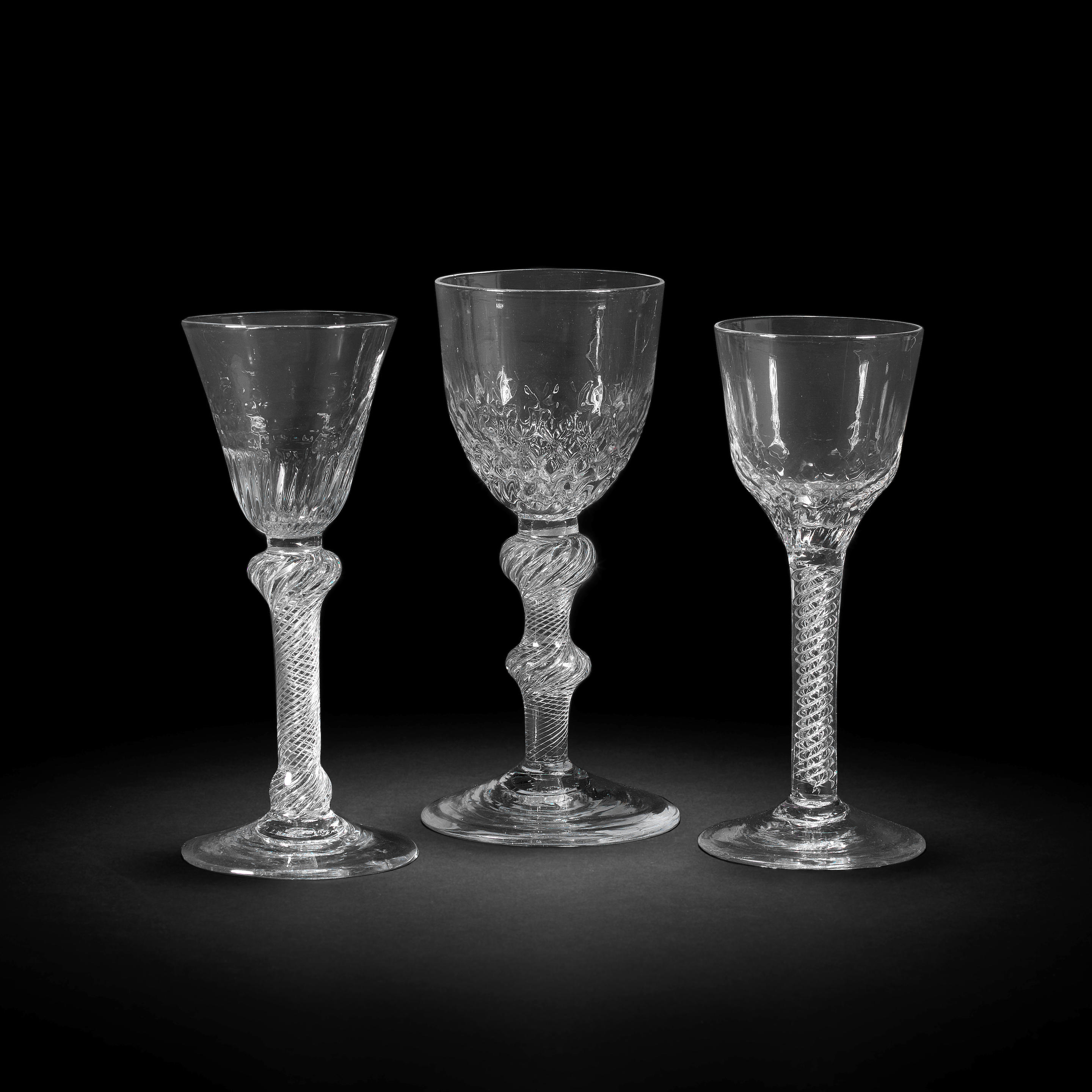 Bonhams Three Moulded Airtwist Wine Glasses Circa 1750