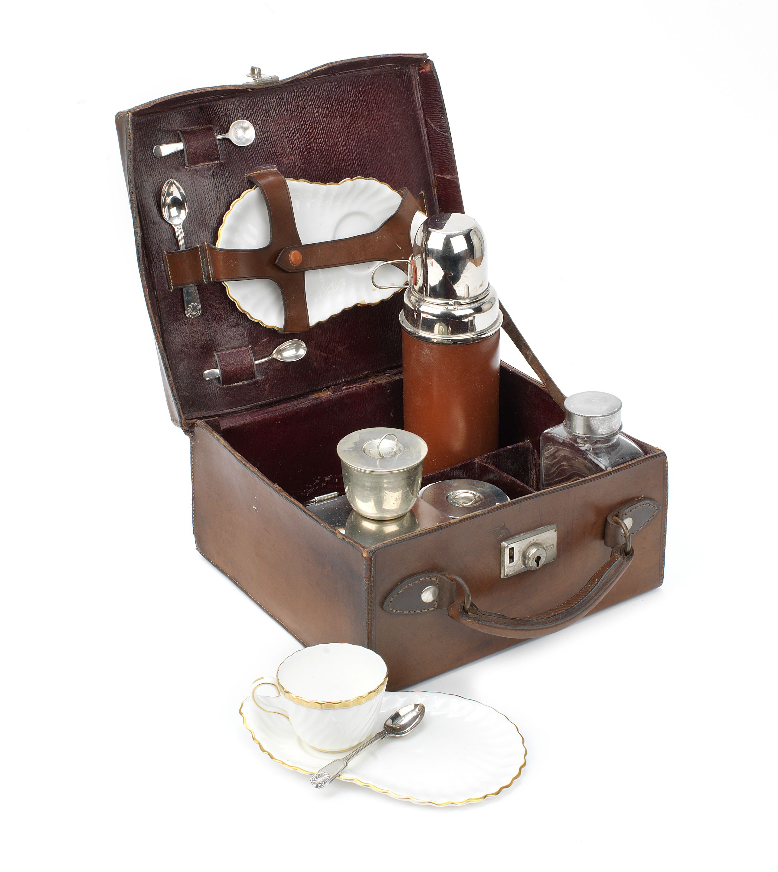 Bonhams Cars : A leather-cased tea-set for two persons, early 20th Century,