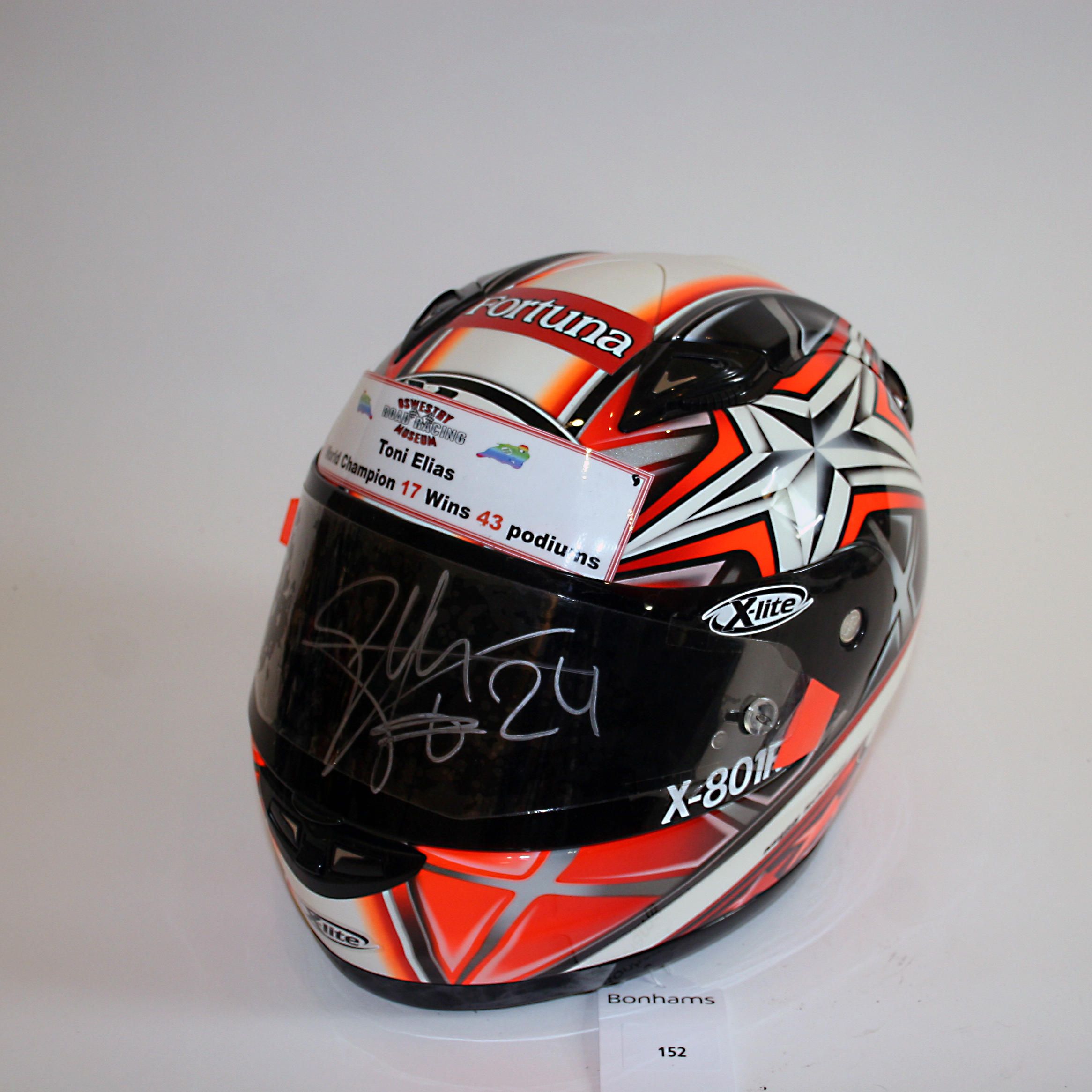 Bonhams Cars : Toni Elias: A full-face X-Lite helmet by Nolan, signed ...
