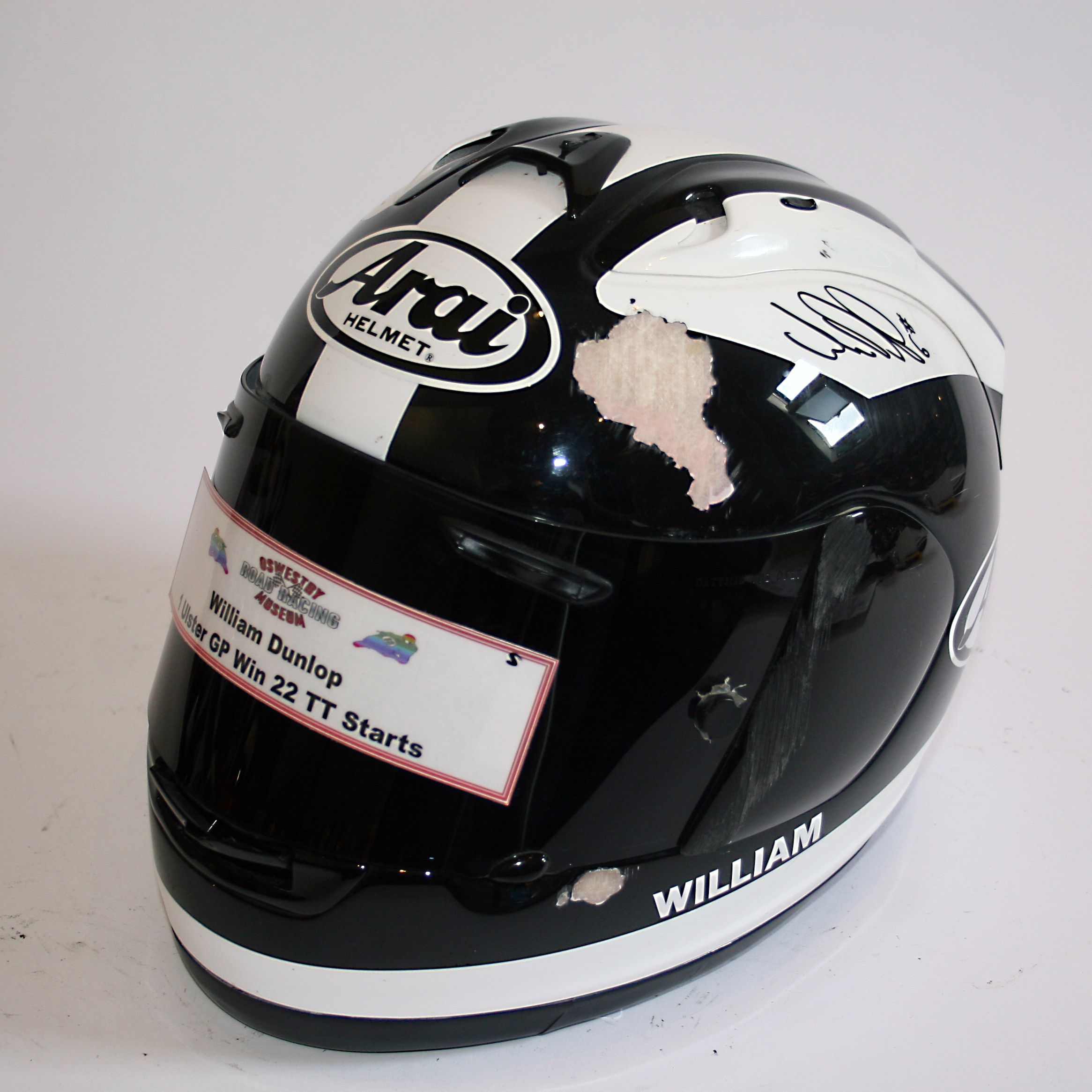 Bonhams Cars : William Dunlop: A signed full-face helmet by Arai