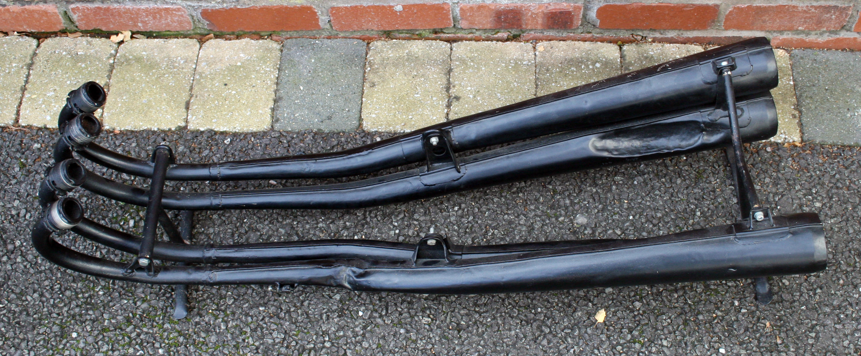 Bonhams Cars : A Jim Redman factory Honda RC164 set of exhaust pipes, 1964 ((5))
