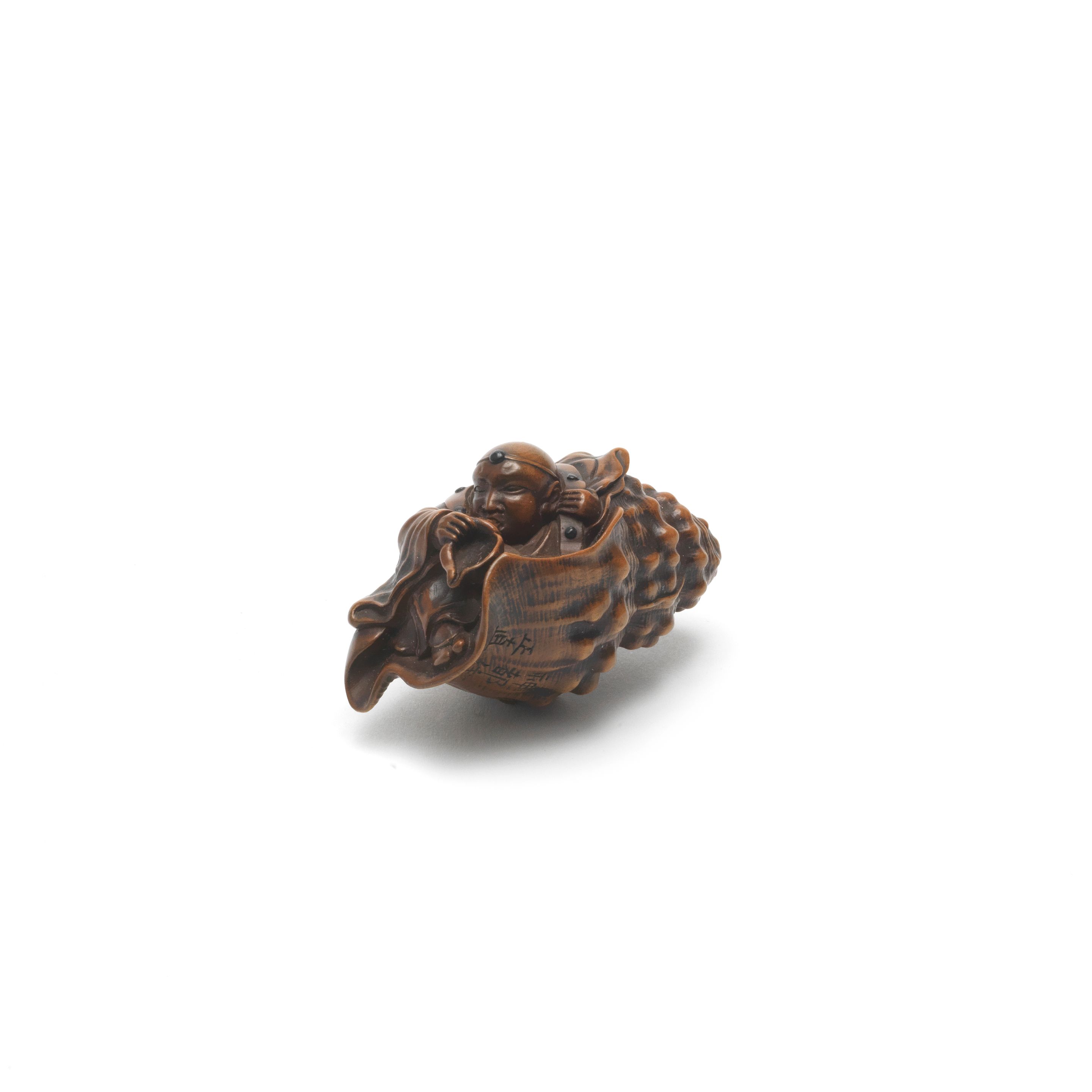 Bonhams : A WOOD NETSUKE OF BENKEI IN A CONCH SHELL Edo period (1615 ...