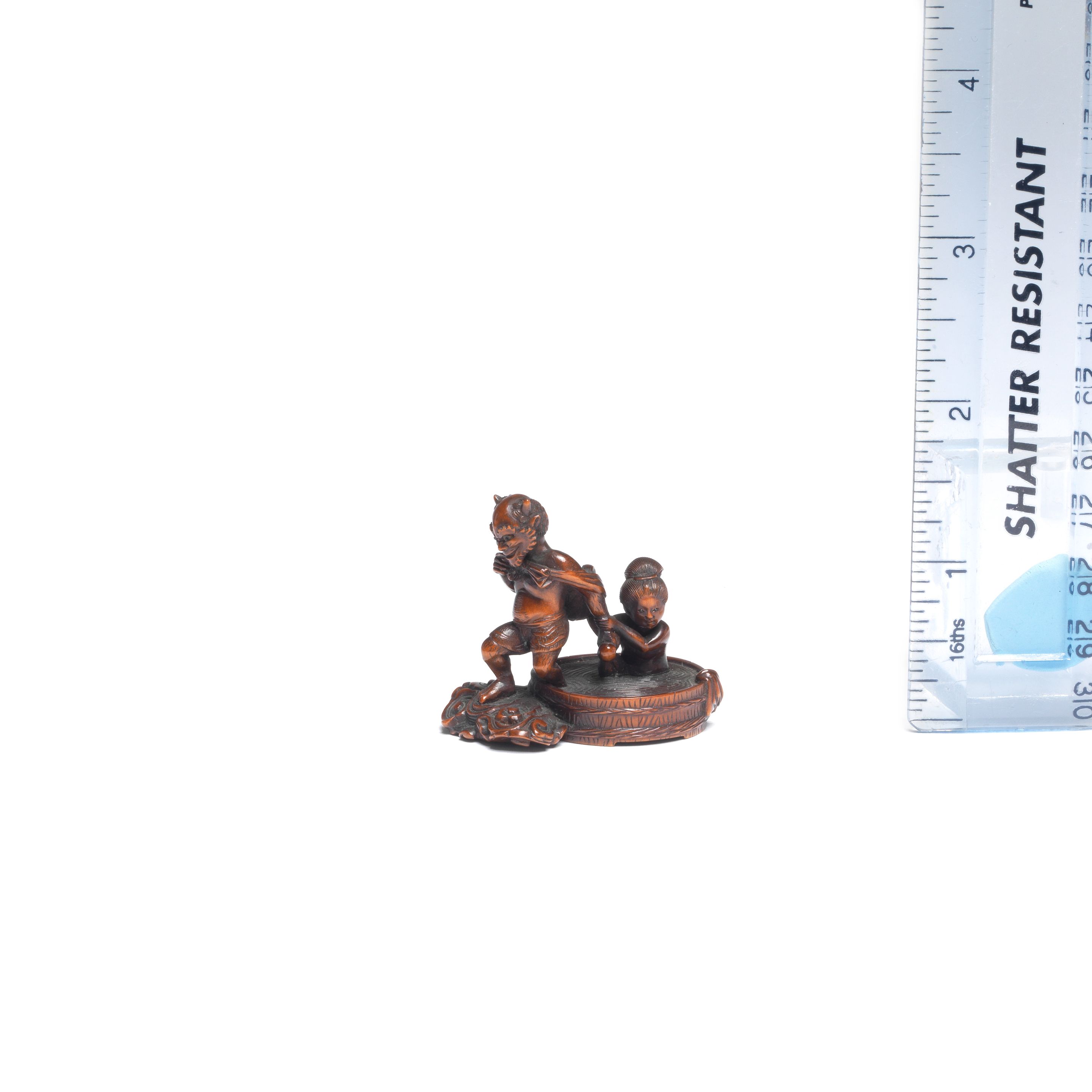 Bonhams : A WOOD NETSUKE OF RAIJIN WITH A BATHING WOMAN By Suketada ...