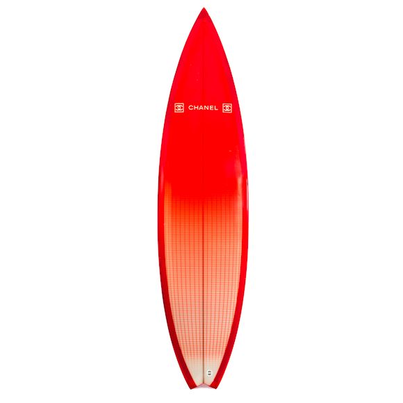 Bonhams : CHANEL: A RED CARBON FIBRE SURFBOARD (includes three keels)