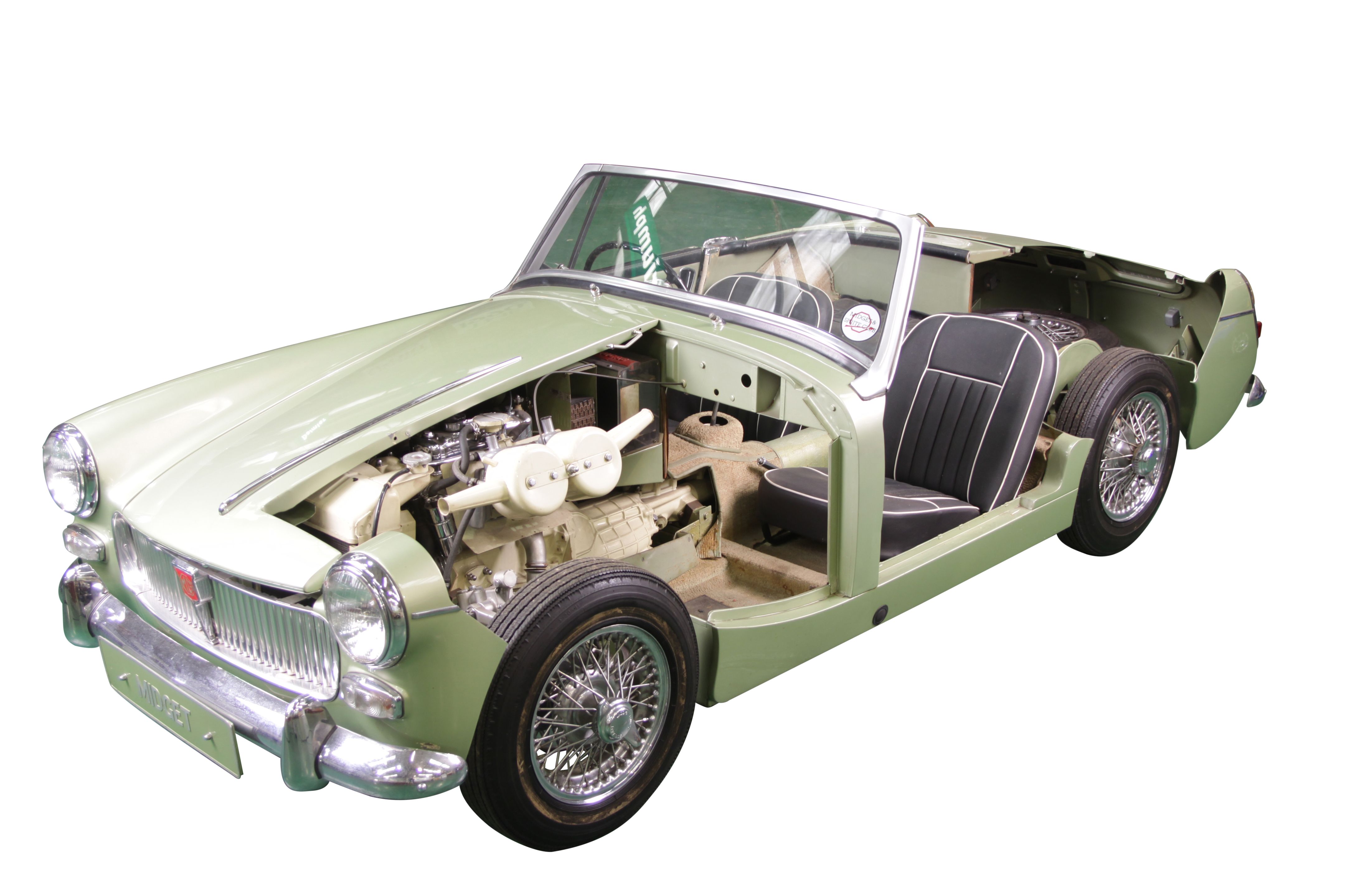 Bonhams Cars : An MG Midget half cut-away display rolling chassis,