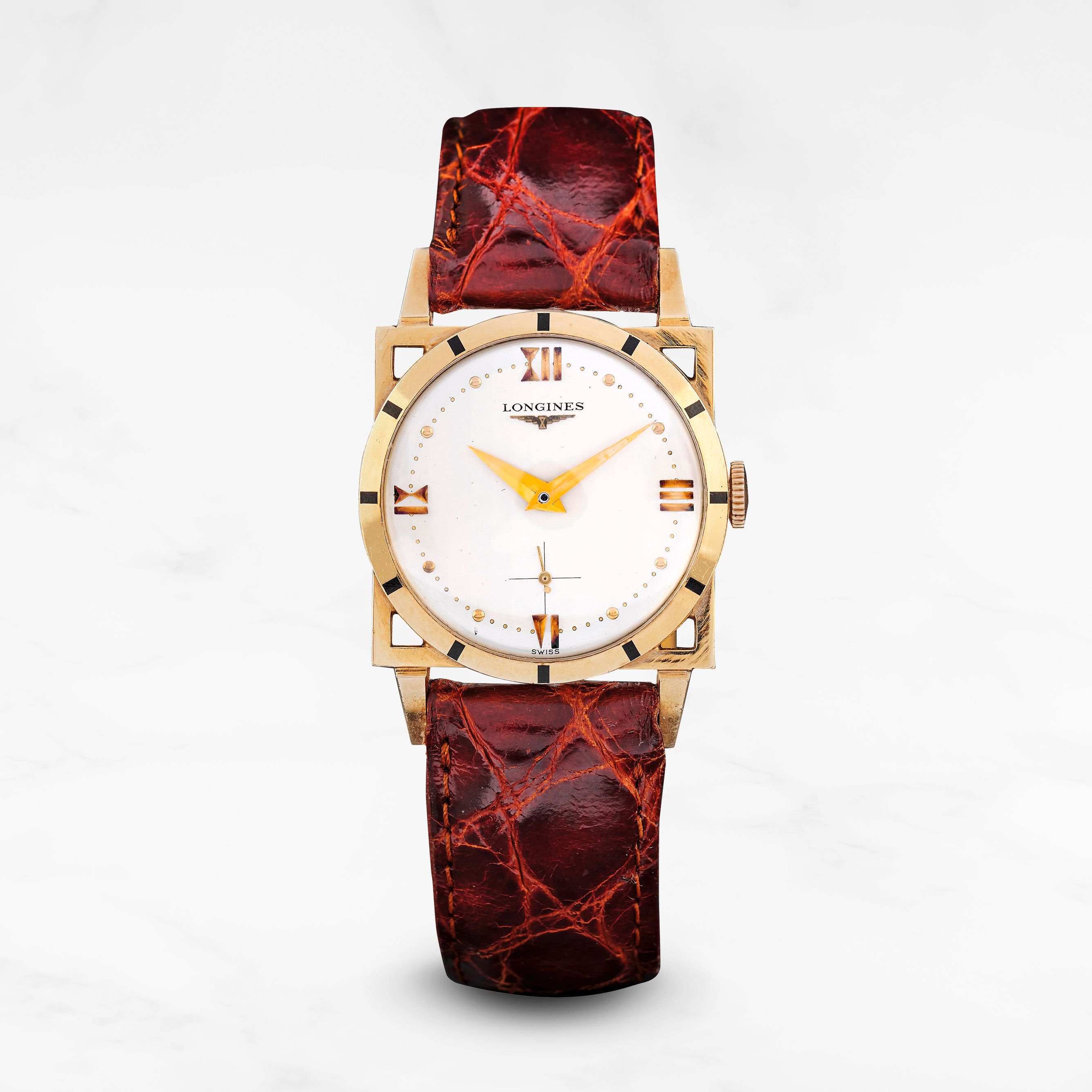 Bonhams : Longines. Rare montre bracelet en or jaune 14K (585) de forme ...