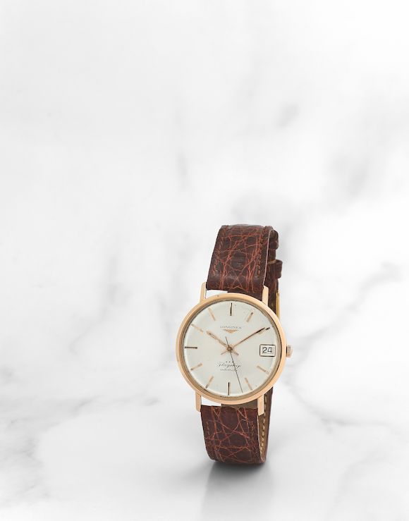 Bonhams : Longines. Montre bracelet en or jaune 18K (750) avec date mouvement automatique ...