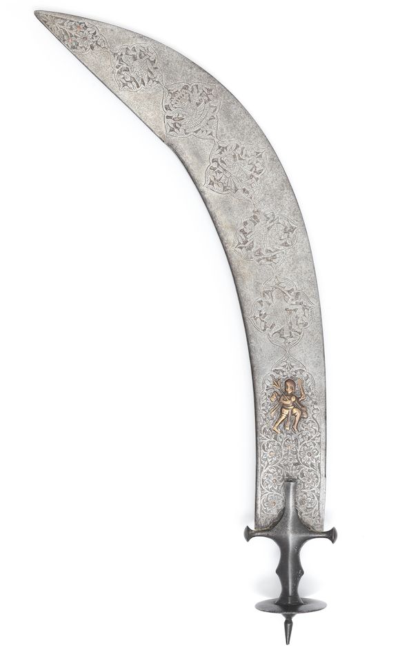 Bonhams : A copper and brass-inlaid steel ritual sword (tegha) India ...