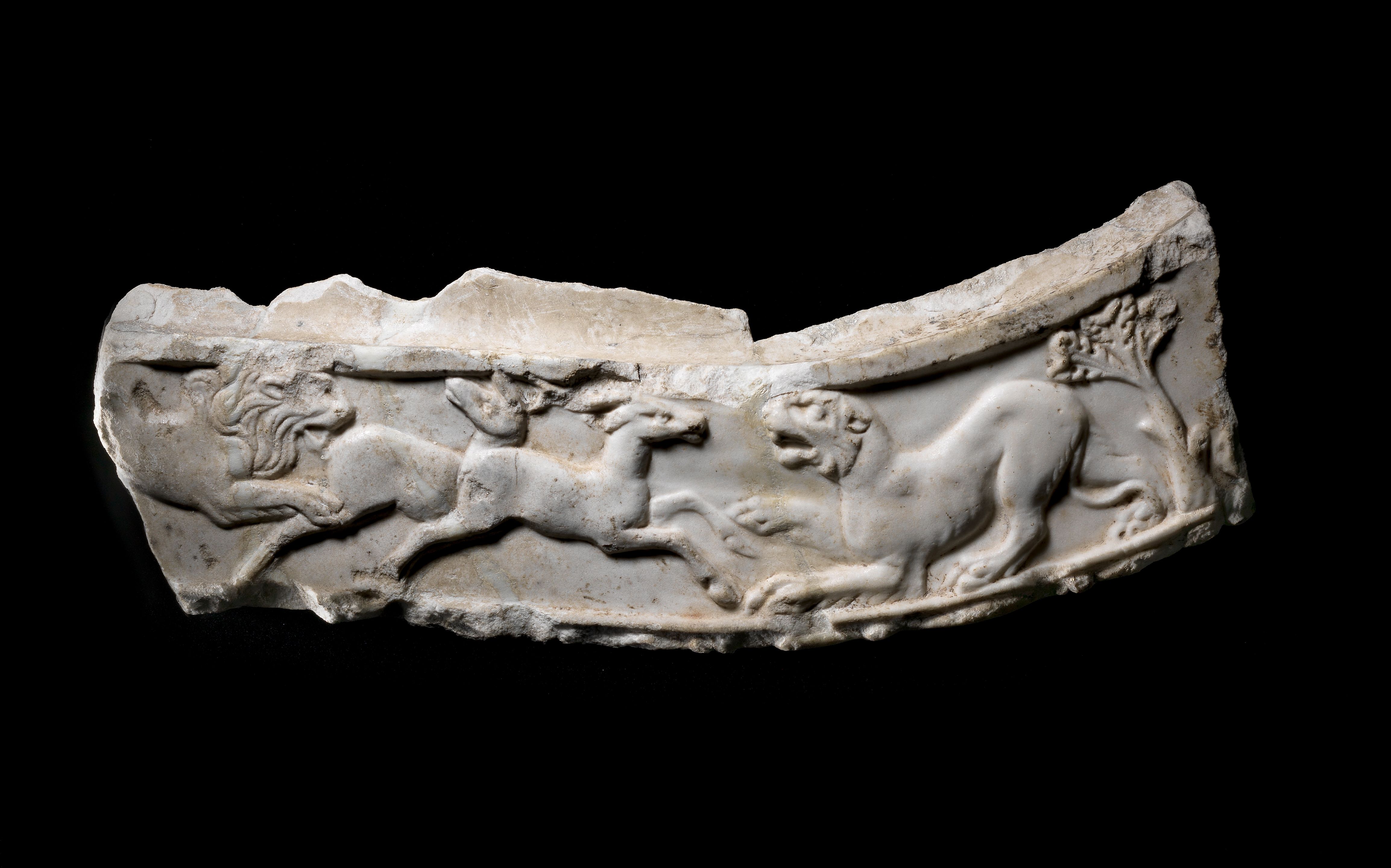 Bonhams : A late Roman marble table top fragment