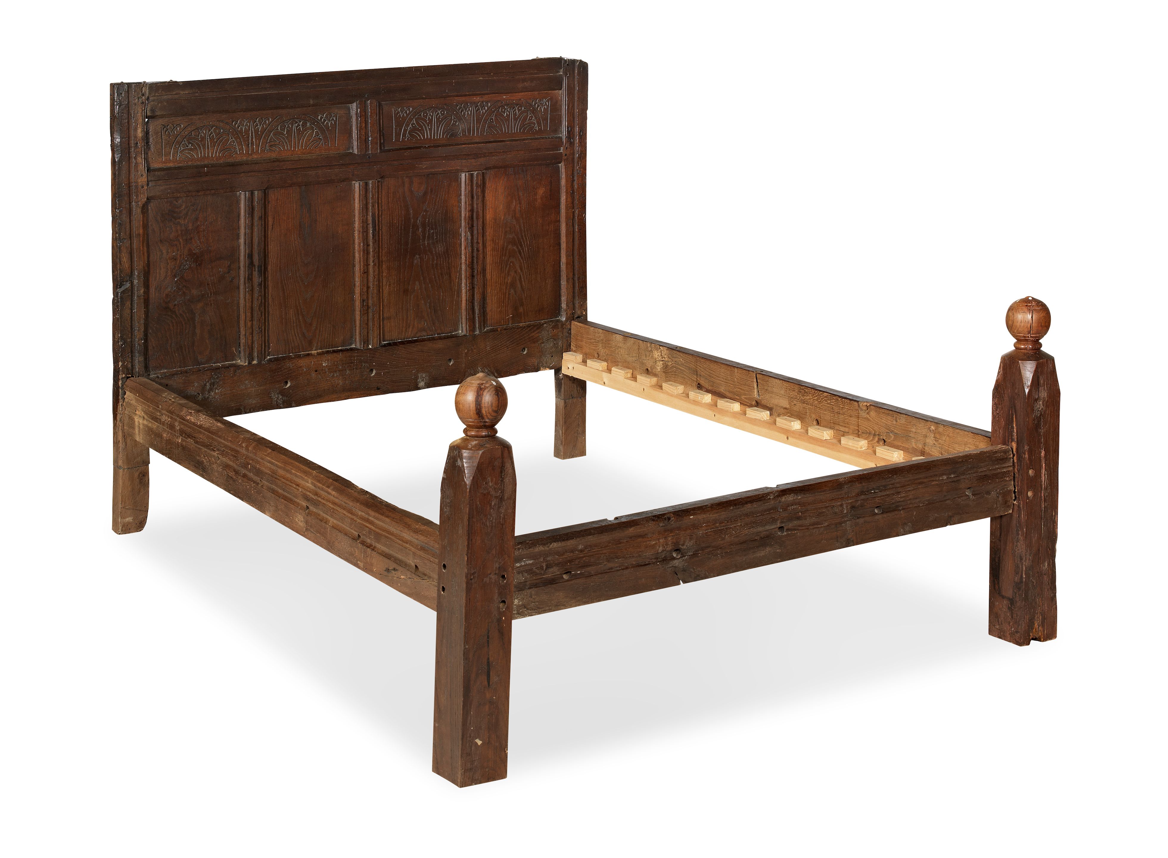 Bonhams : A 17th century-style oak truckle bed
