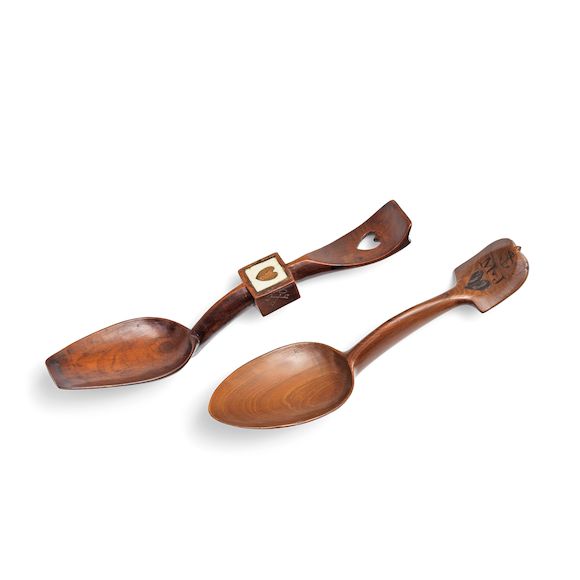 Bonhams : A Welsh late 18th century love spoon, together with another (2)
