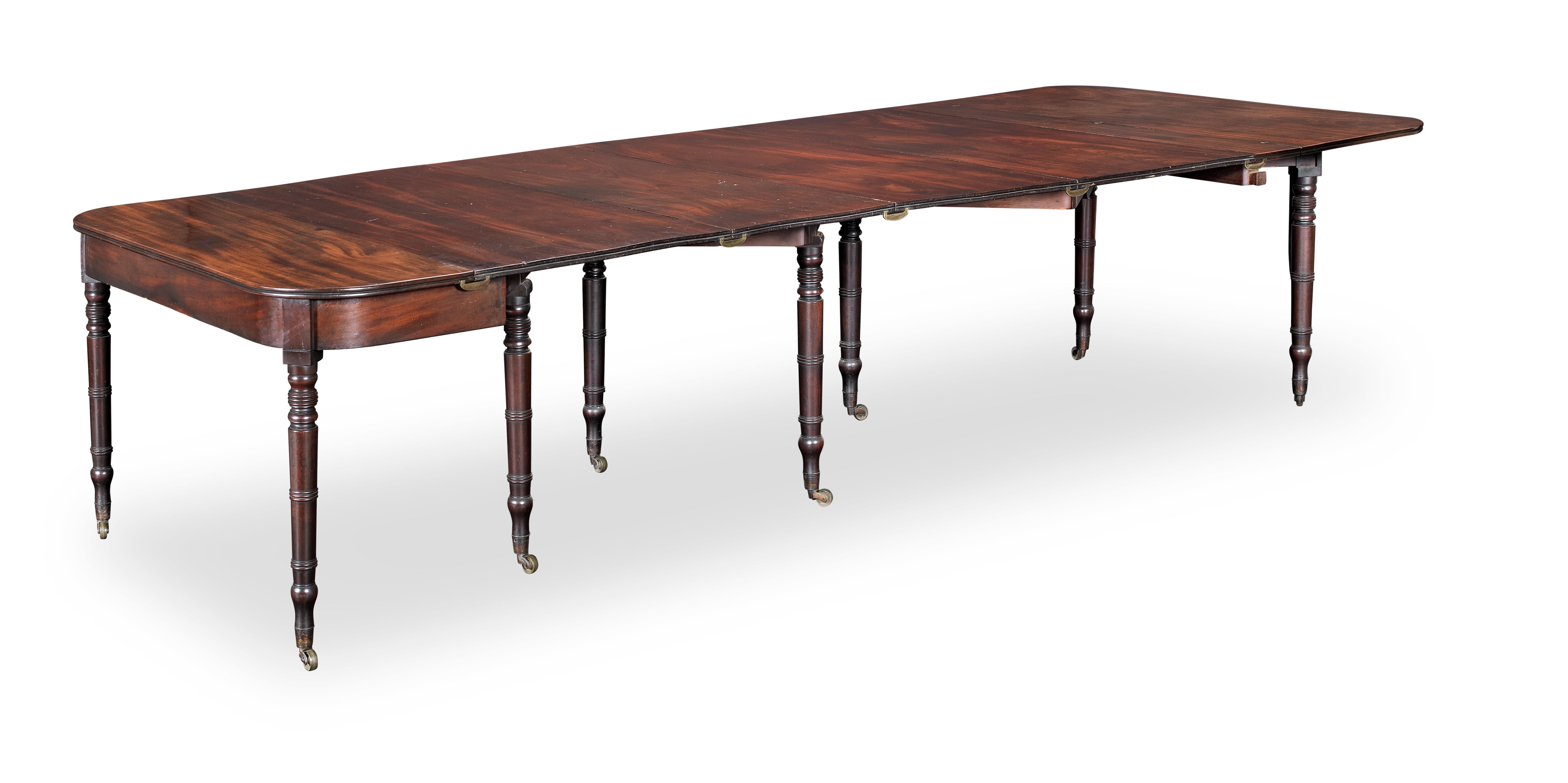 Bonhams : A Regency mahogany concertina-action dining table