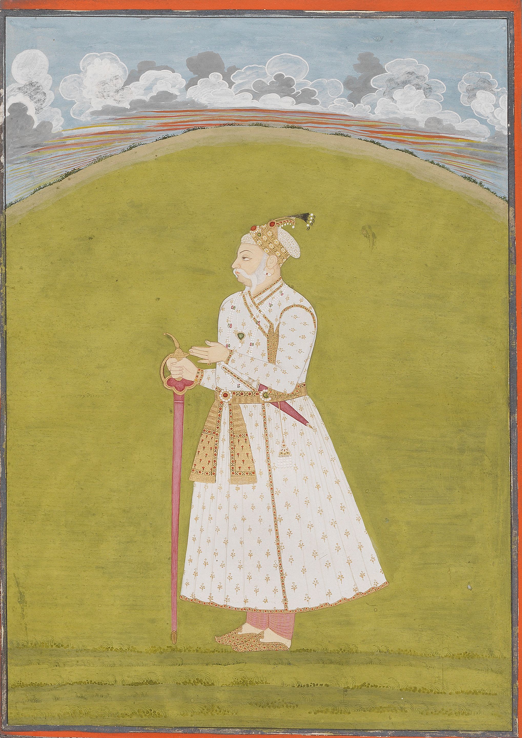 Bonhams : A Mughal courtier standing in a landscape, dressed in white ...