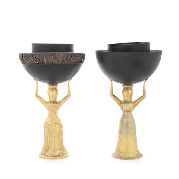 Bonhams : A pair of Greek silver, silver-gilt and patinated figural ...