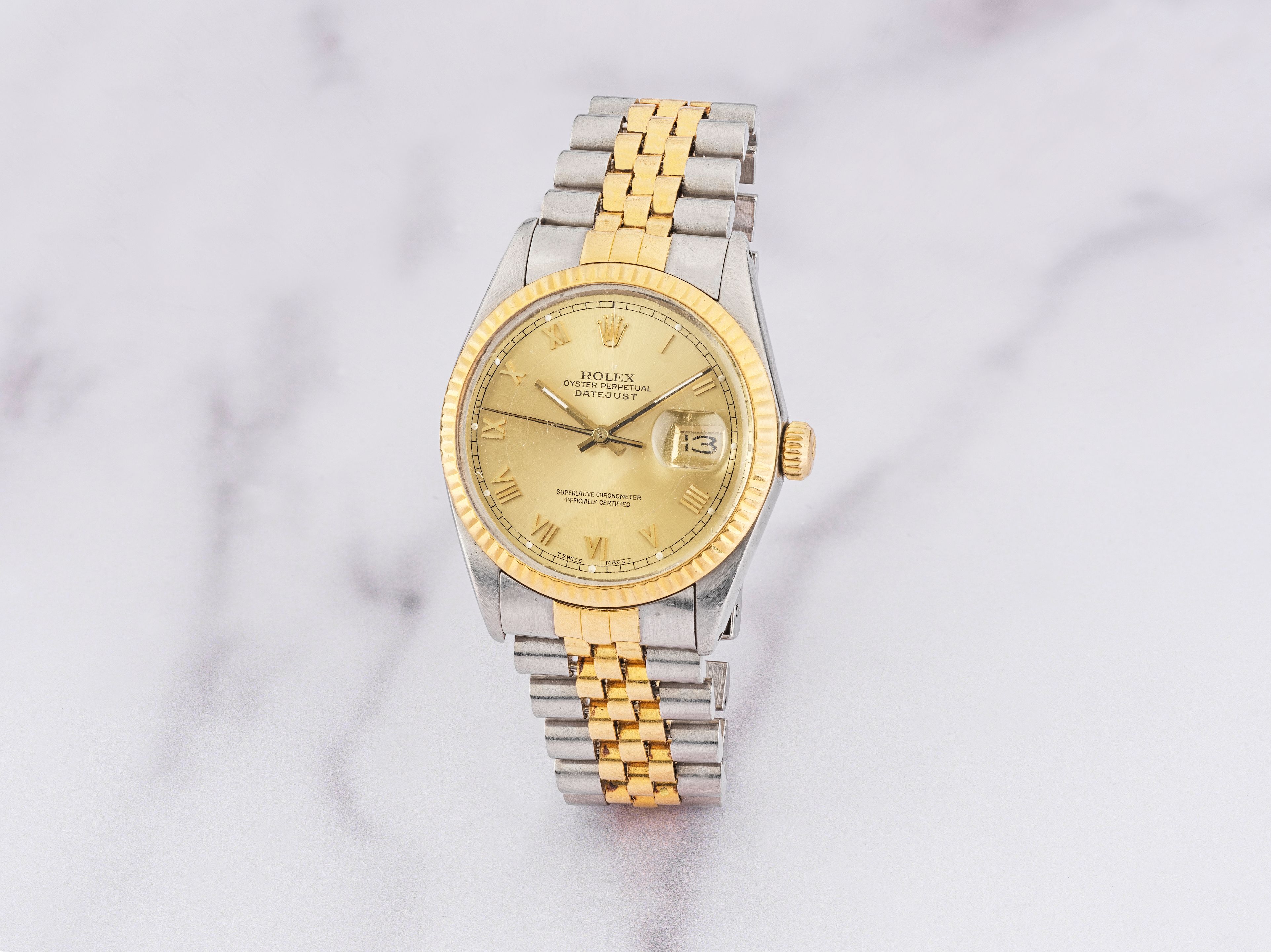 Bonhams : Rolex. Montre bracelet en or jaune 18K (750) et acier avec ...
