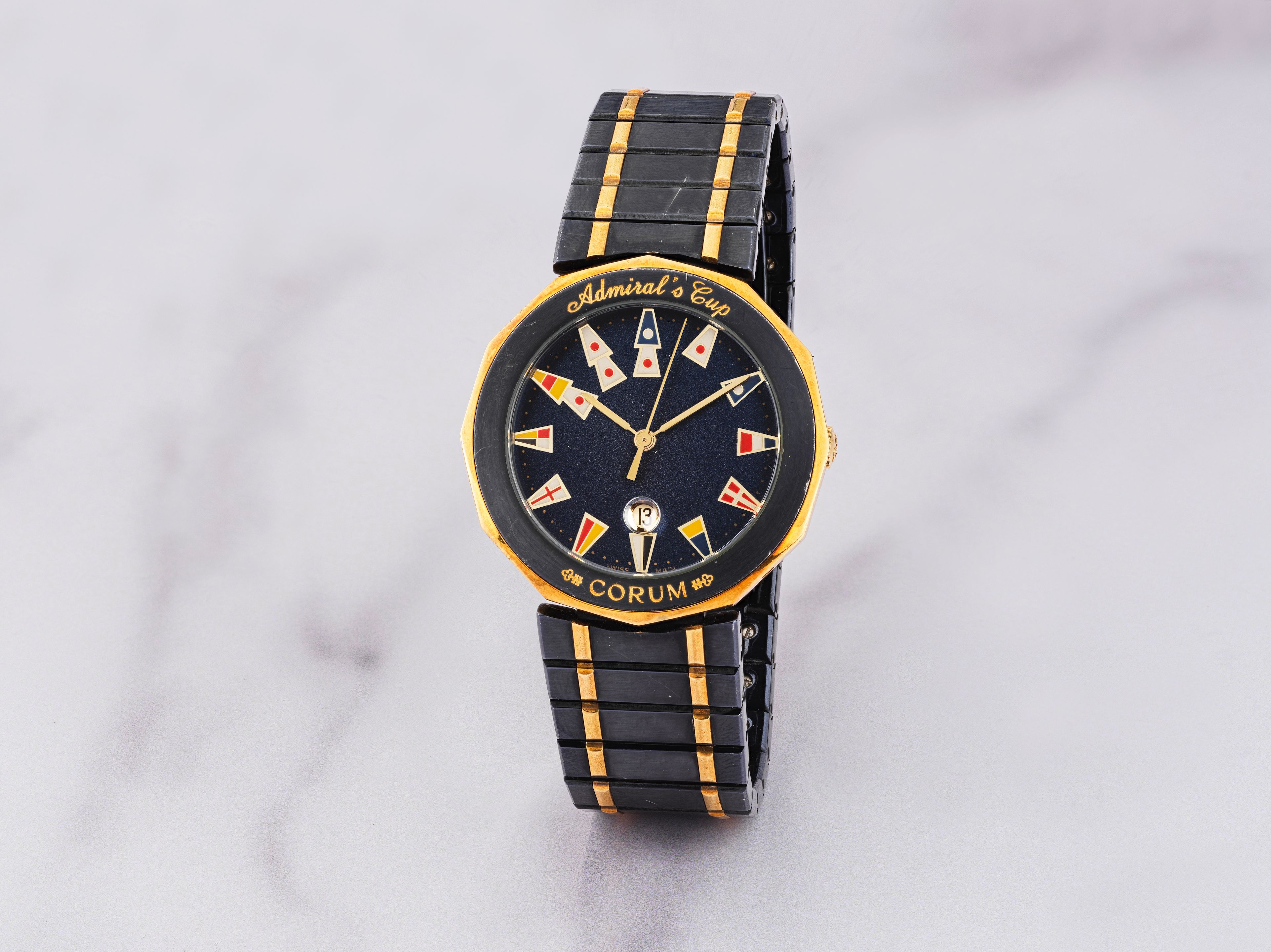 Bonhams : Corum. Montre bracelet en or jaune 18K (750) et acier bleui ...