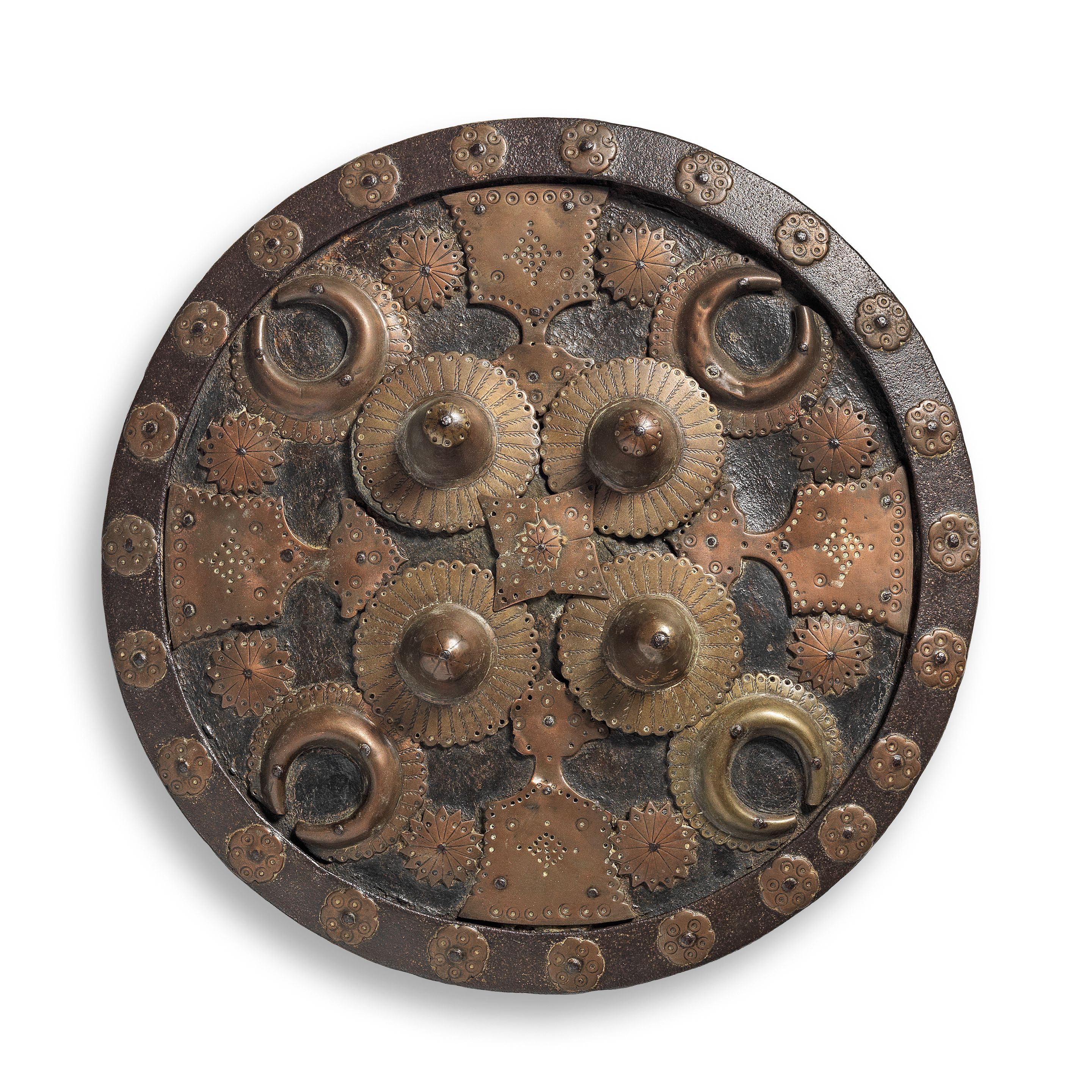 Bonhams : A brass-mounted hide shield (dhal) Baluchistan, 19th Century