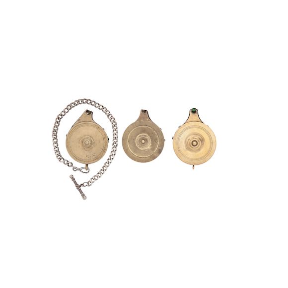 Bonhams : Three Circular Brass Percussion Cap Dispensers (3)