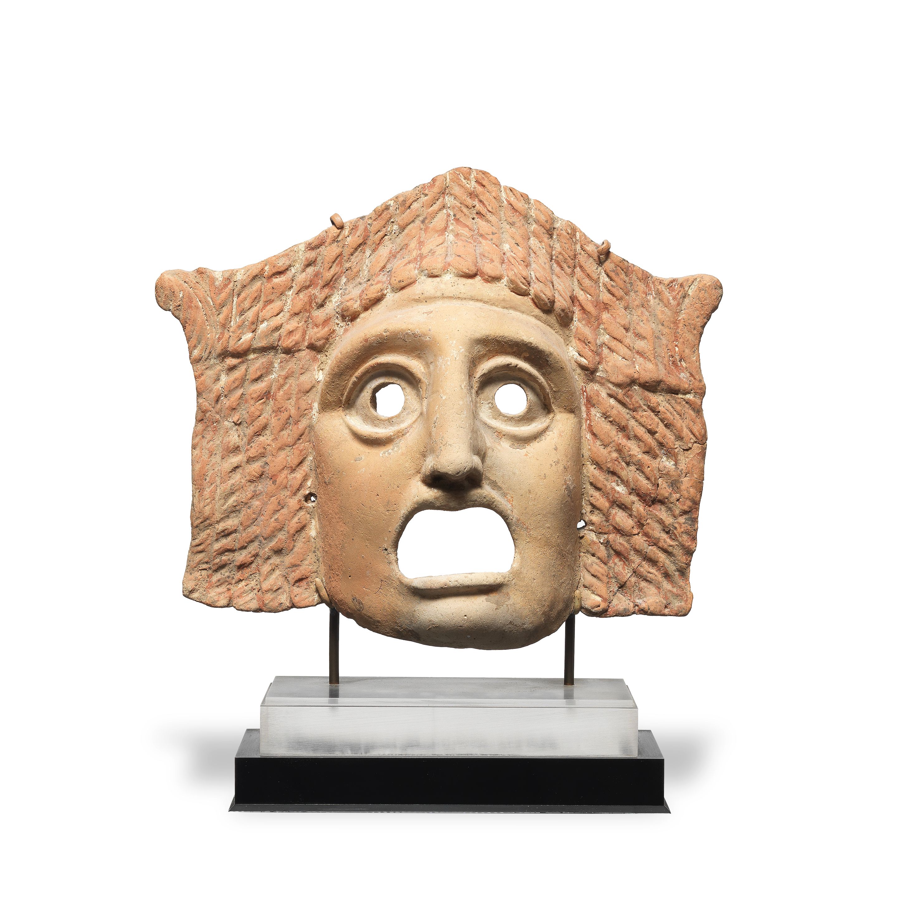 Bonhams : A Graeco-Roman terracotta tragic actor's mask