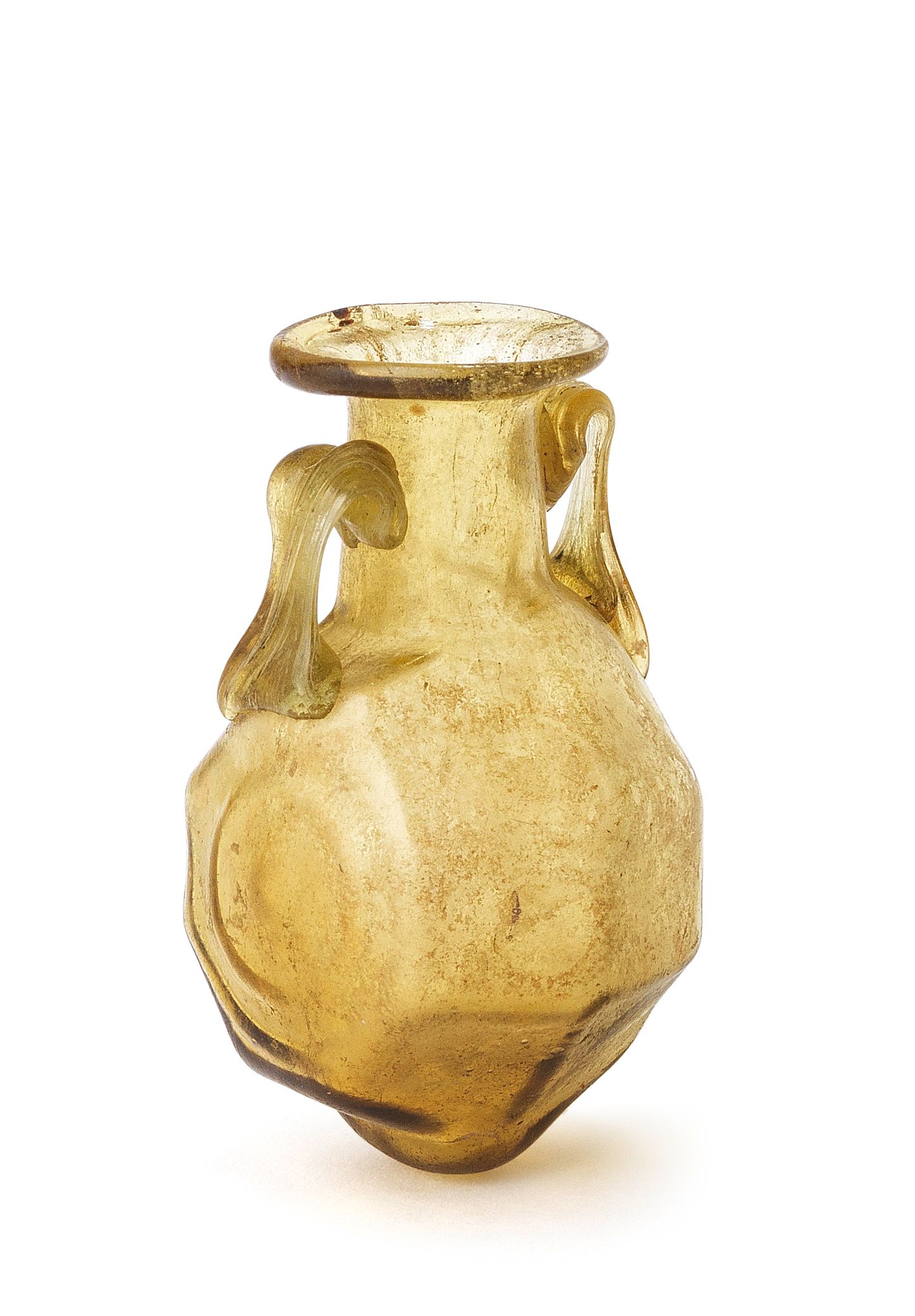 Bonhams : A Roman pale amber glass octagonal amphoriskos
