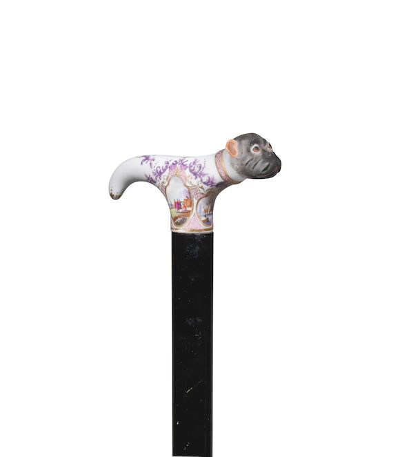 Bonhams : A German porcelain cane handle in the shape of a pug, late ...