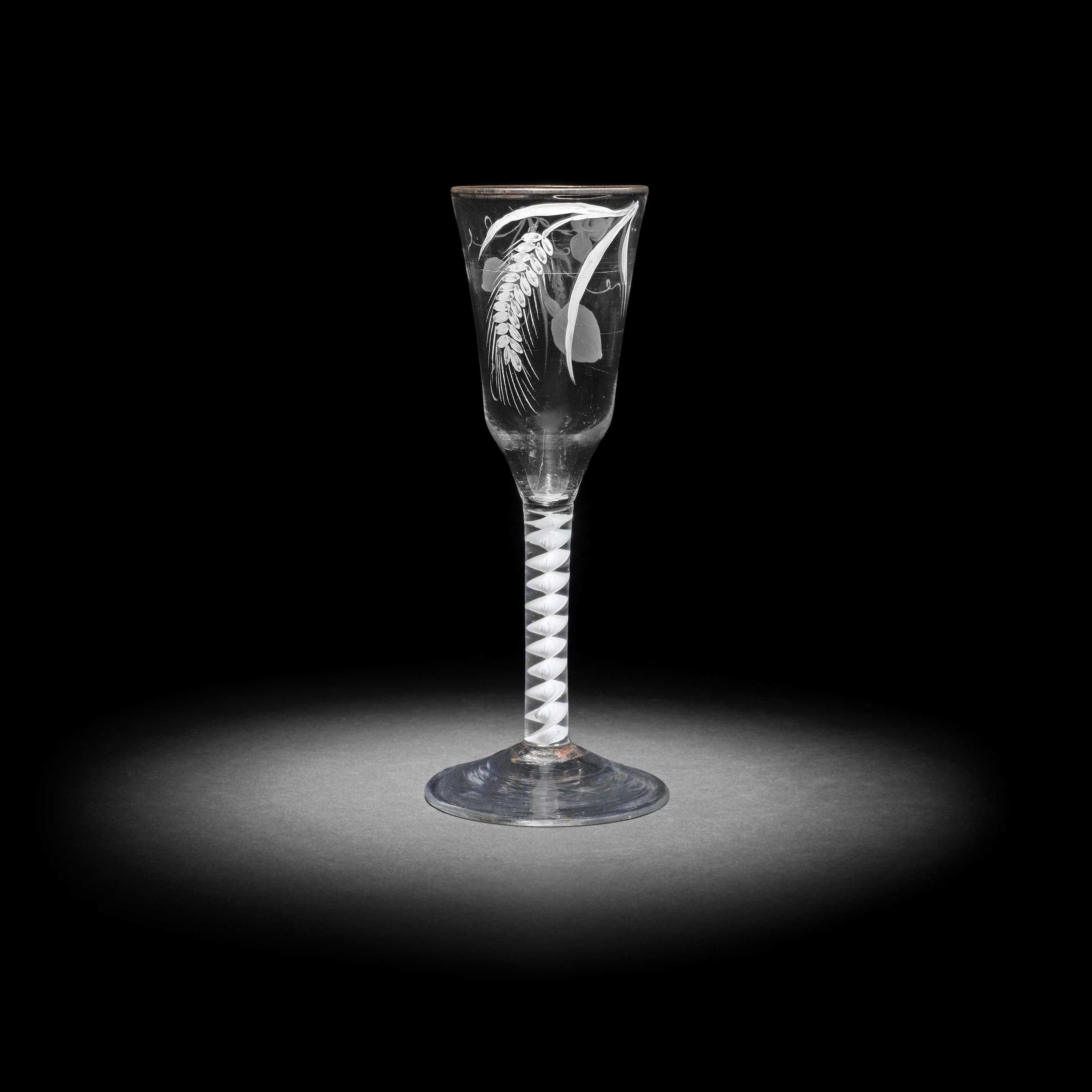 Bonhams : A Beilby enamelled opaque twist ale glass, circa 1765-70