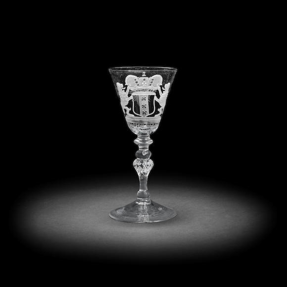 Bonhams A Dutch Engraved Armorial Light Baluster Wine Glass Circa 1755