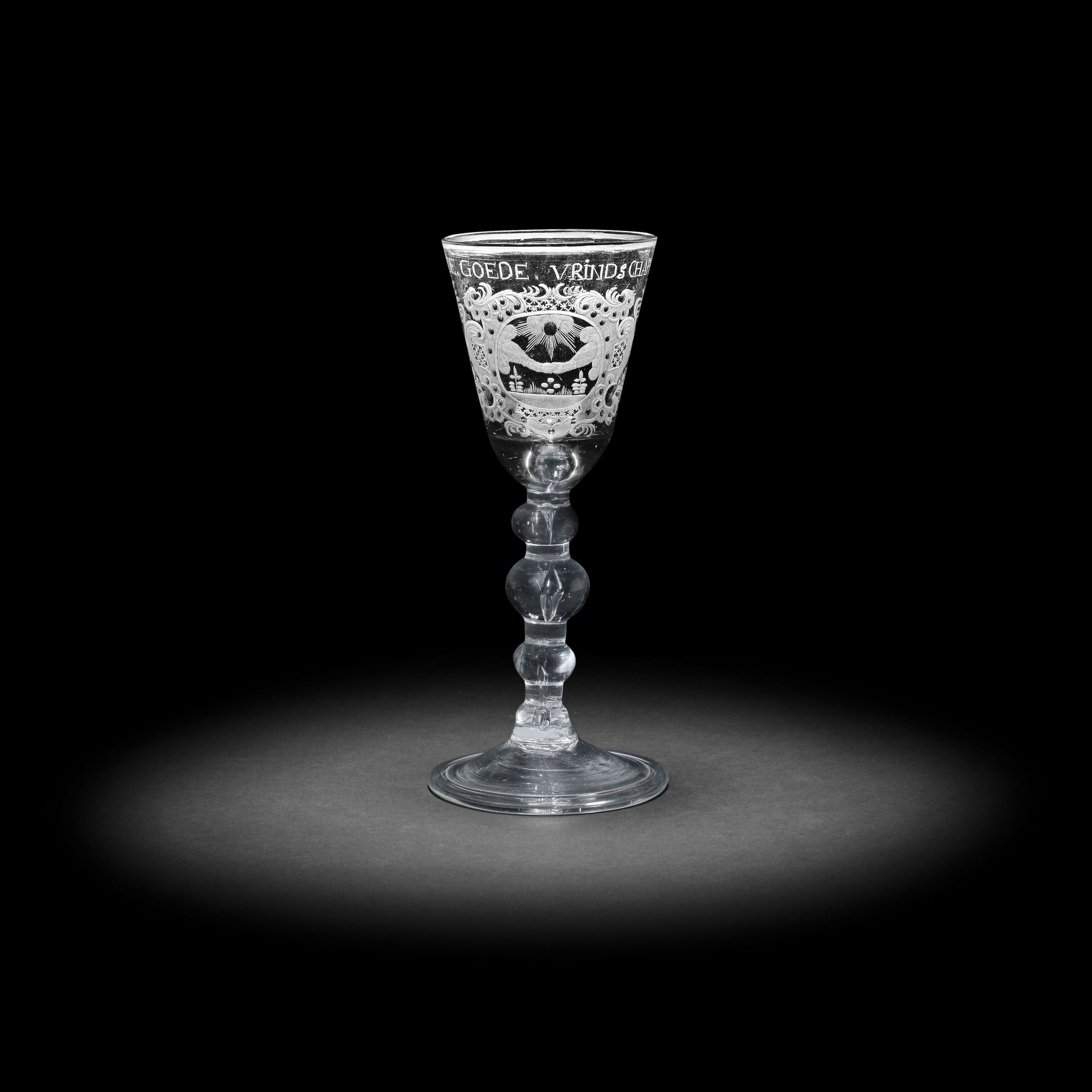 Bonhams : A Dutch engraved baluster 'Friendship' glass, circa 1750