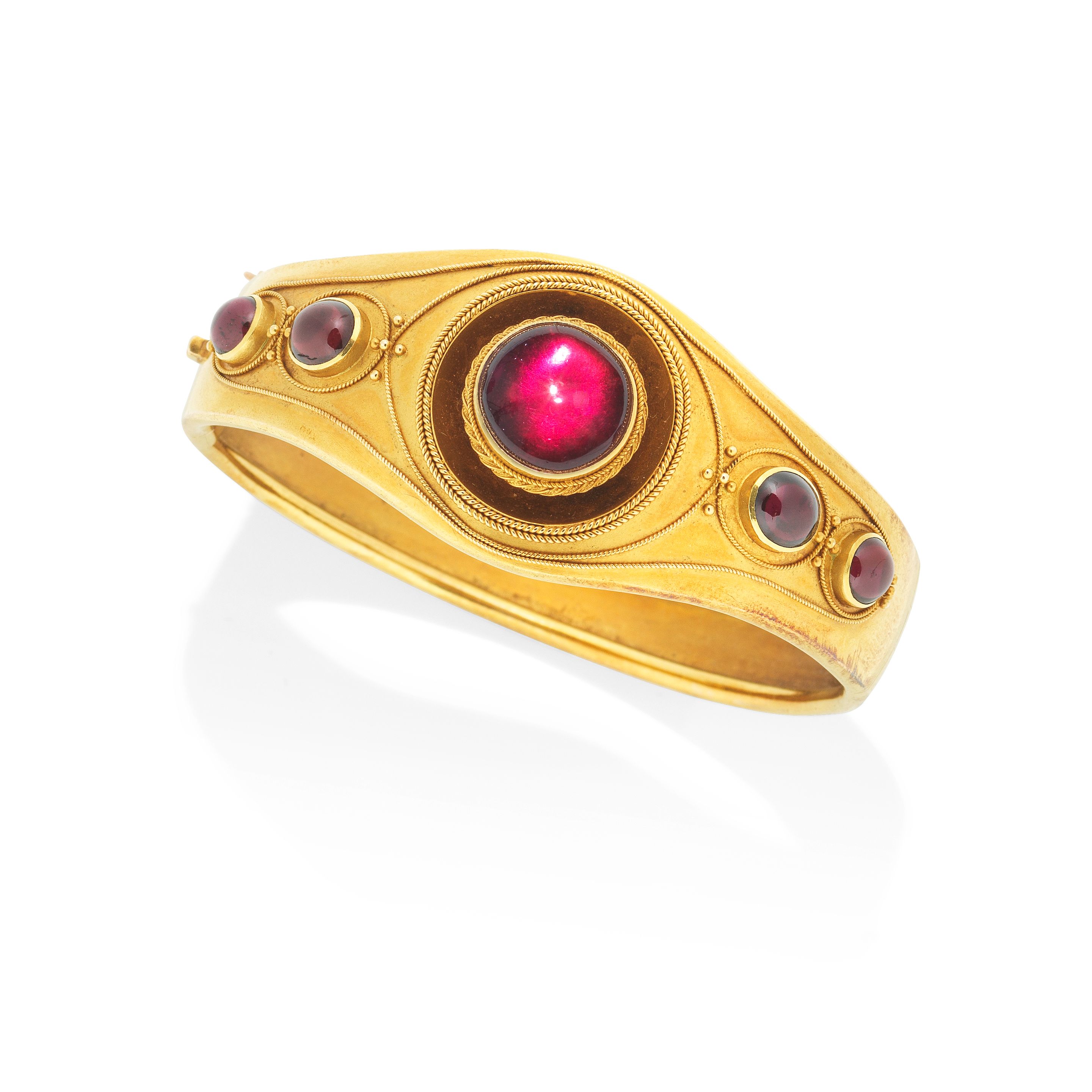 Bonhams : A GOLD AND GARNET BANGLE, CIRCA 1860