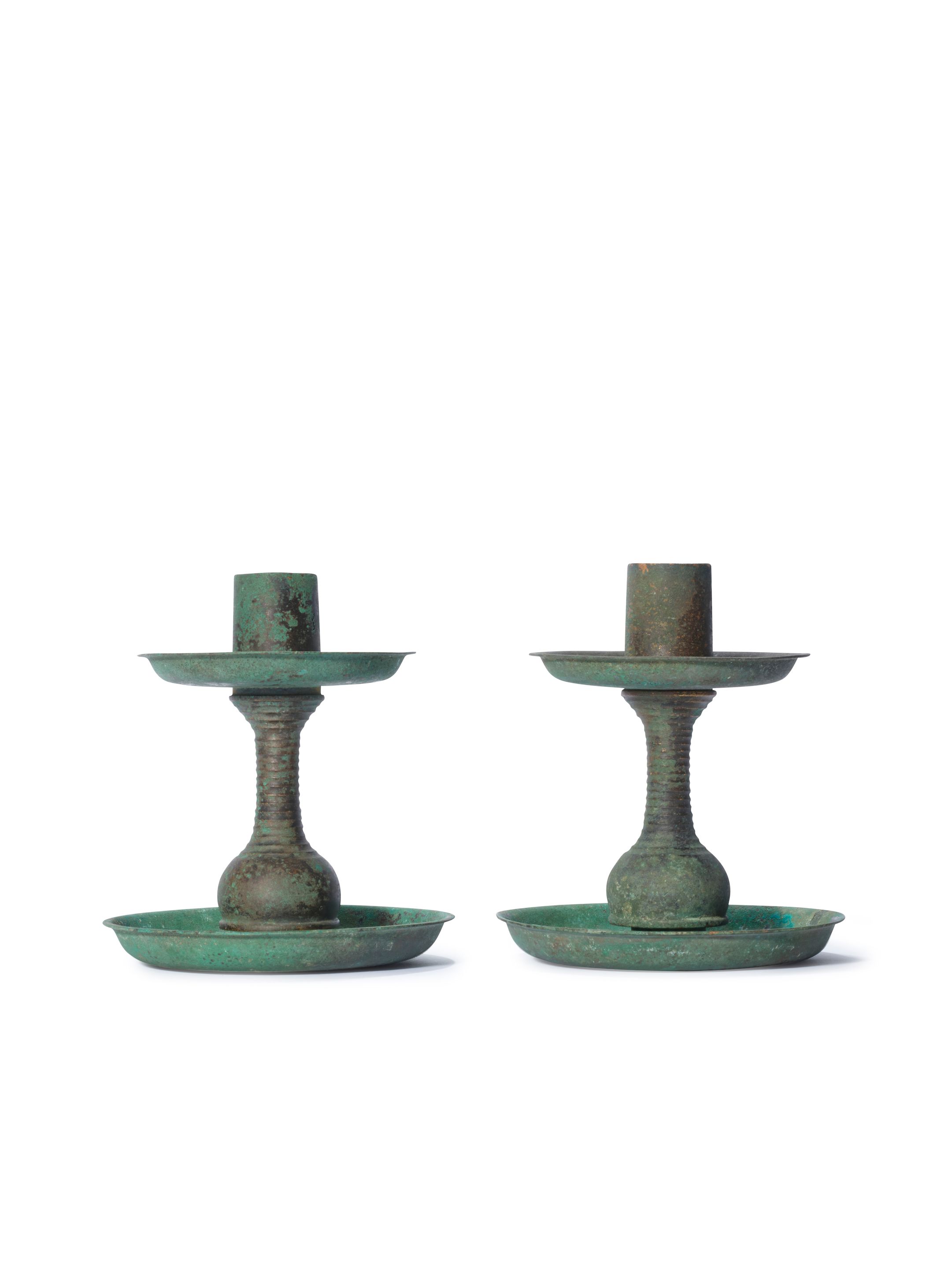 Bonhams : A PAIR OF BRONZE CANDLESTICK HOLDERS Tang Dynasty