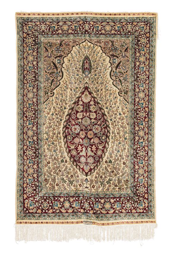 Bonhams : A signed silk Hereke carpet West Anatolia, 153cm x 103.5cm