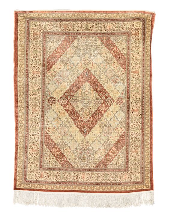 Bonhams : A signed silk Hereke carpet West Anatolia, 127cm x 98cm