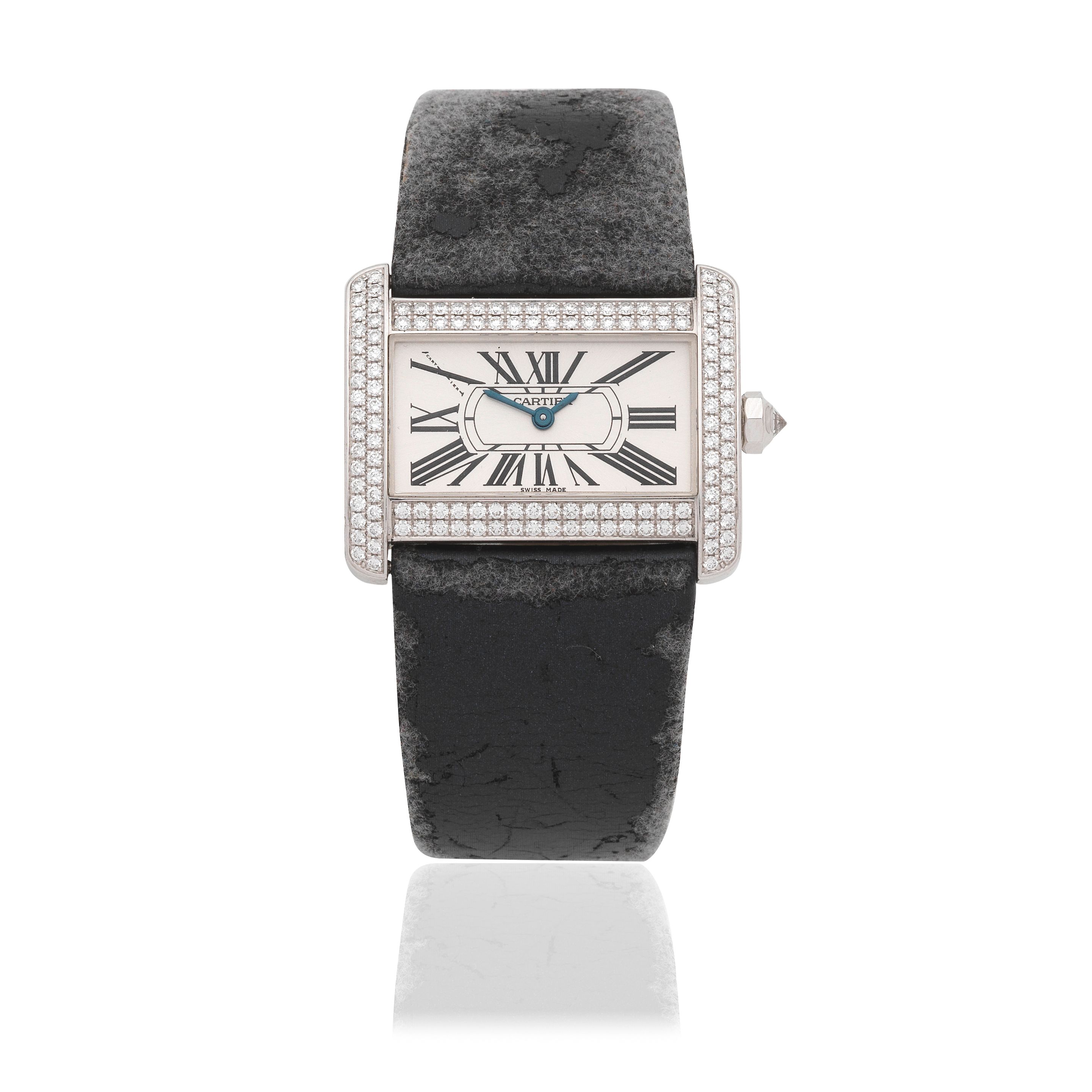 Bonhams : Cartier. A lady's 18K white gold diamond set quartz ...