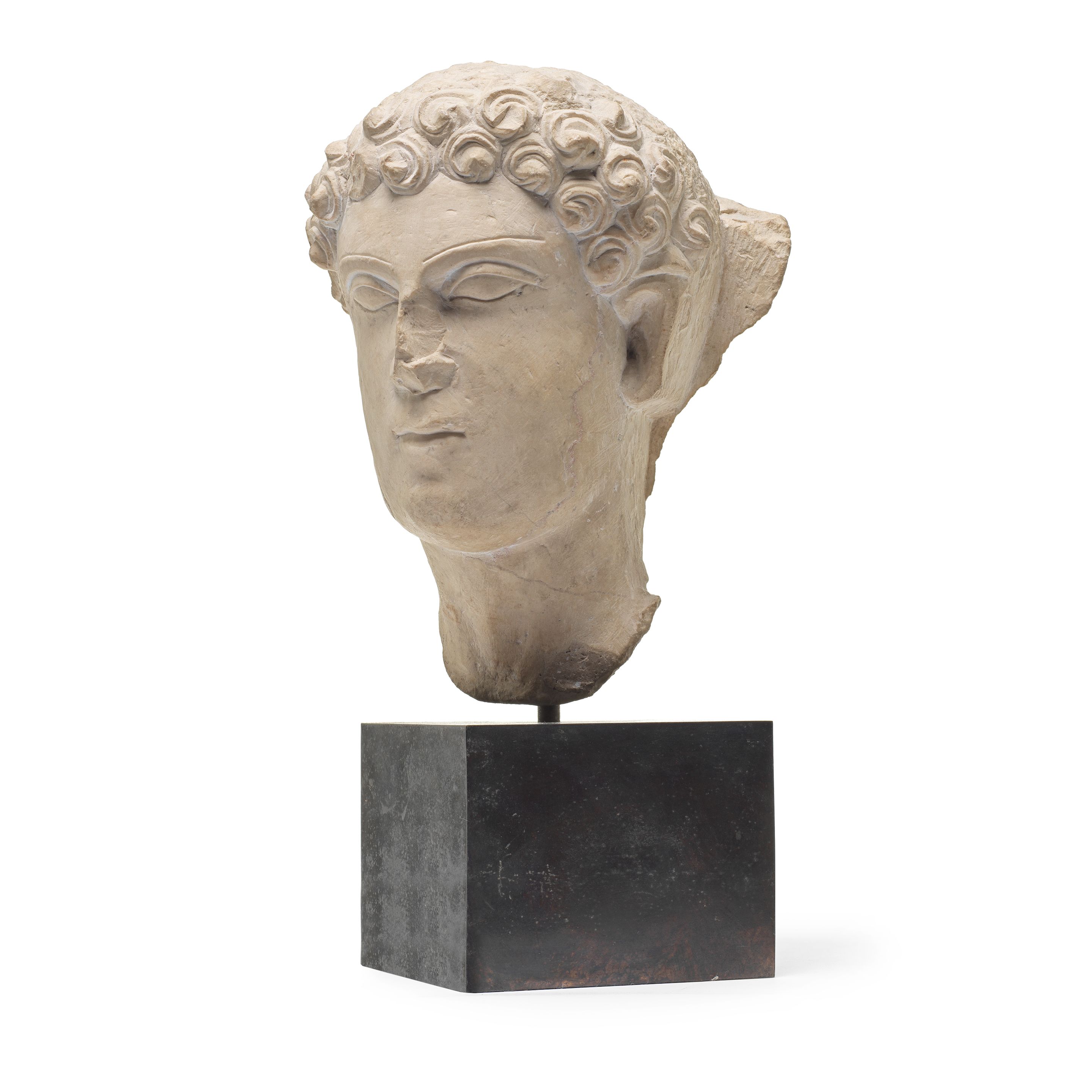 Bonhams : A carved marble bust fragment of a stylised head in the ...