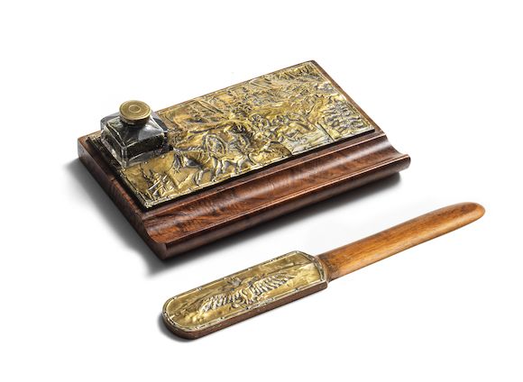 Bonhams : An embossed brass and wood ink stand and a letter opener with ...